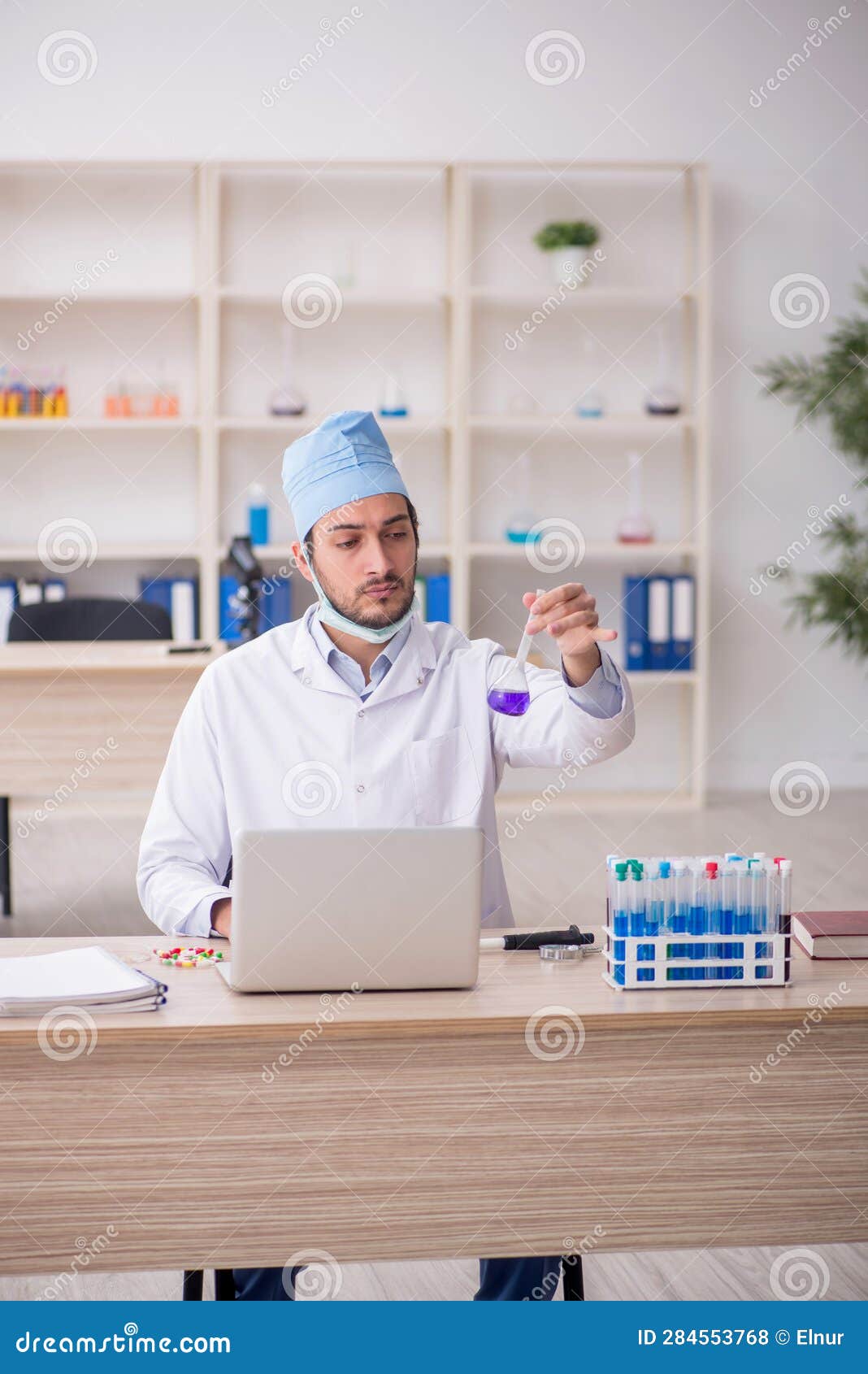 Young Male Chemist Working at the Lab Stock Photo - Image of analysis ...