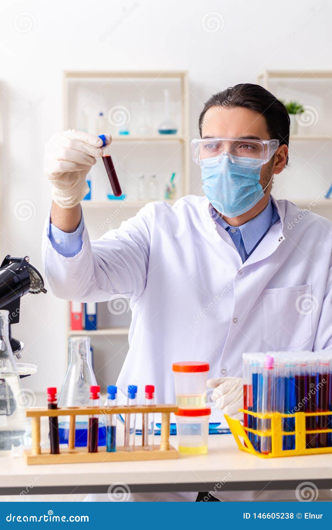 The Young Male Chemist Working in the Lab Stock Photo - Image of ...