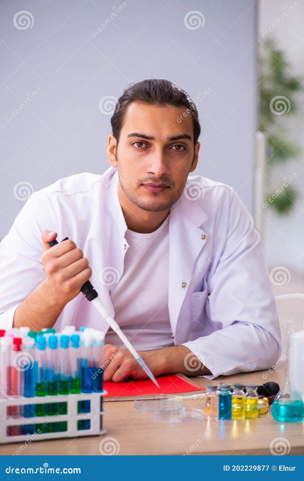 Young Male Chemistry Teacher in the Classroom Stock Image - Image of ...