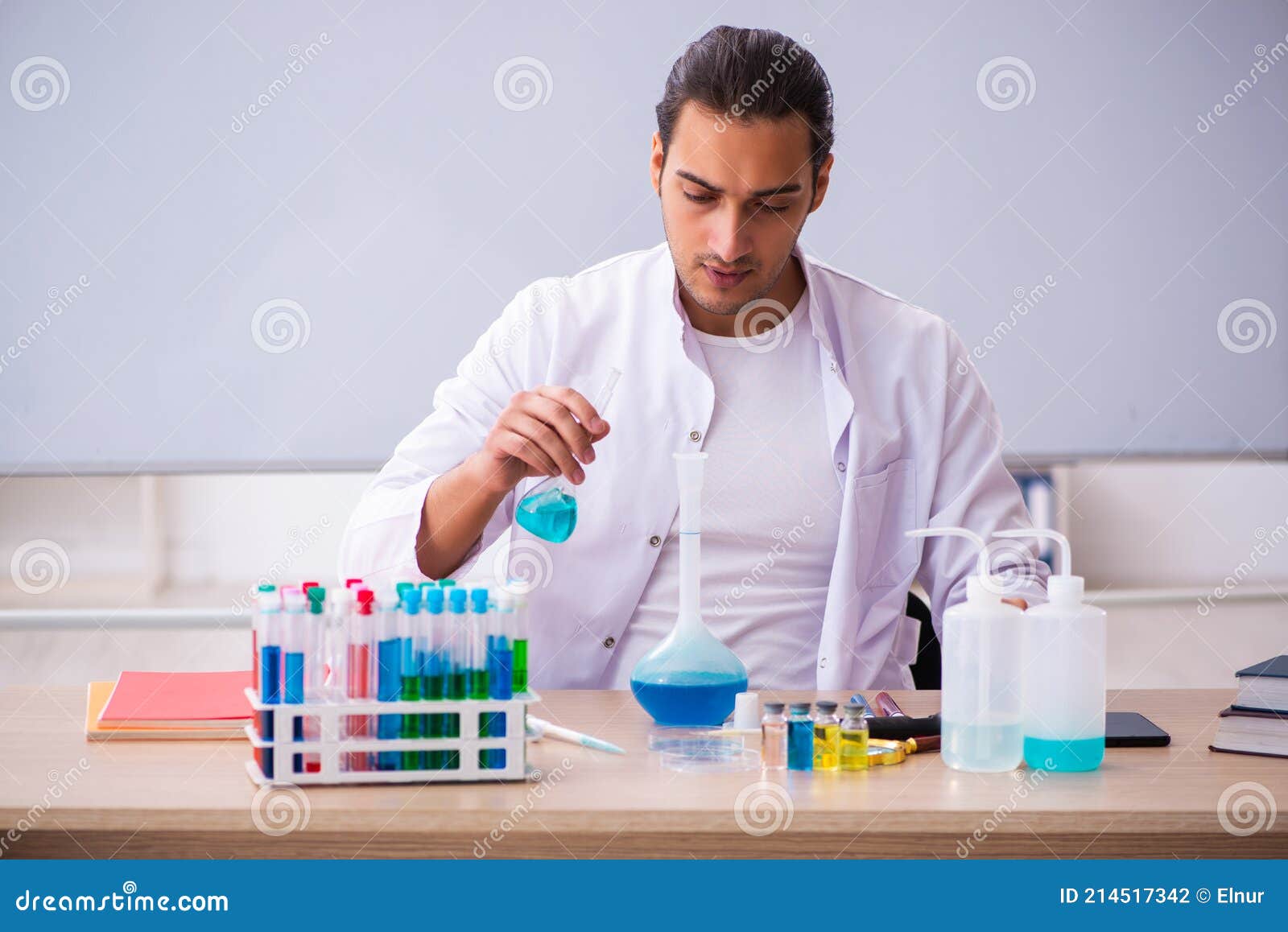 Young Male Chemistry Teacher in the Classroom Stock Photo - Image of ...