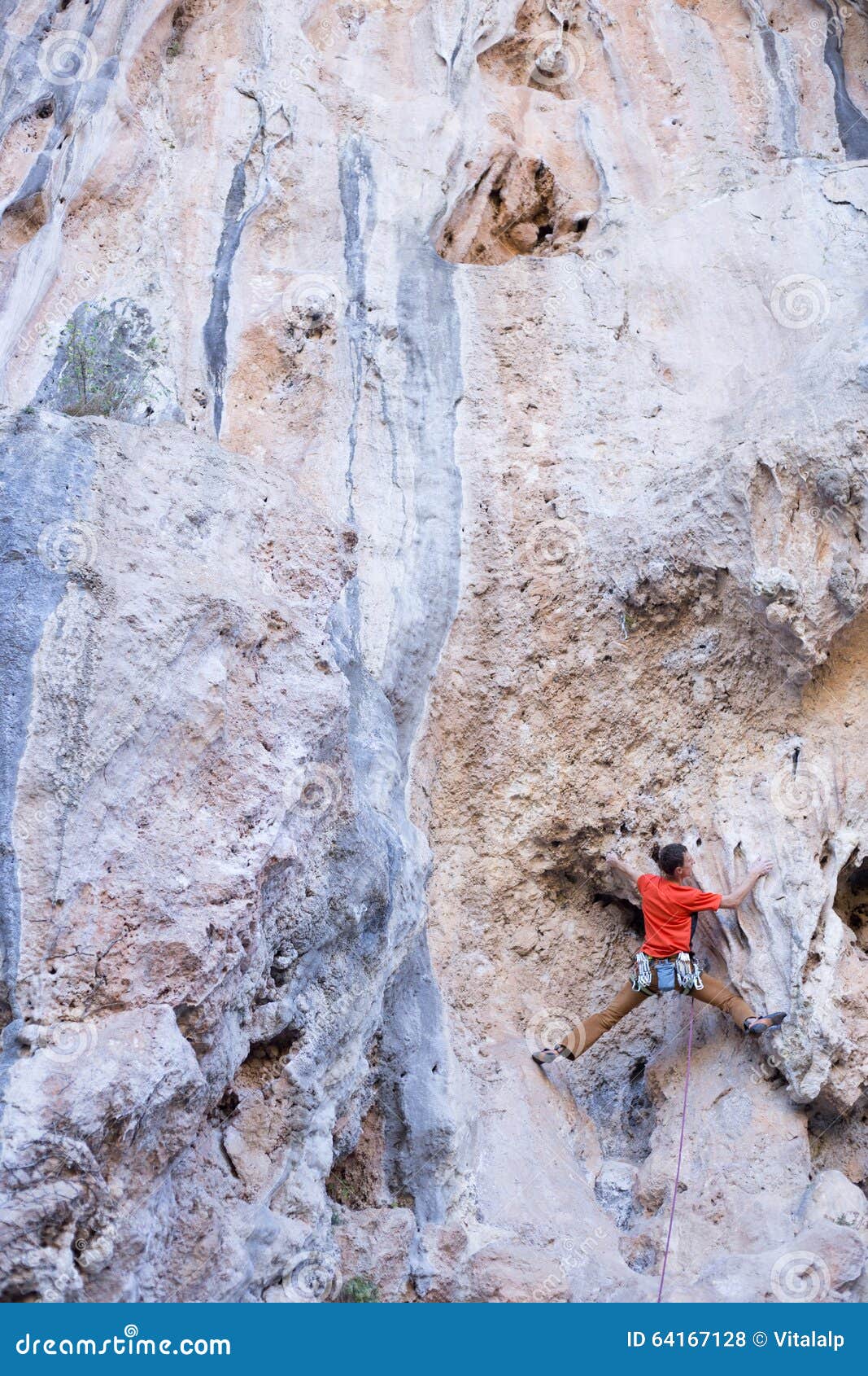 Young Male Climber Hanging by a Cliff. Stock Photo - Image of cling ...