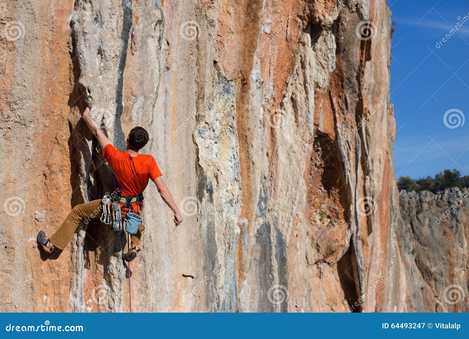 Young Male Climber Hanging by a Cliff Stock Image - Image of clouds ...