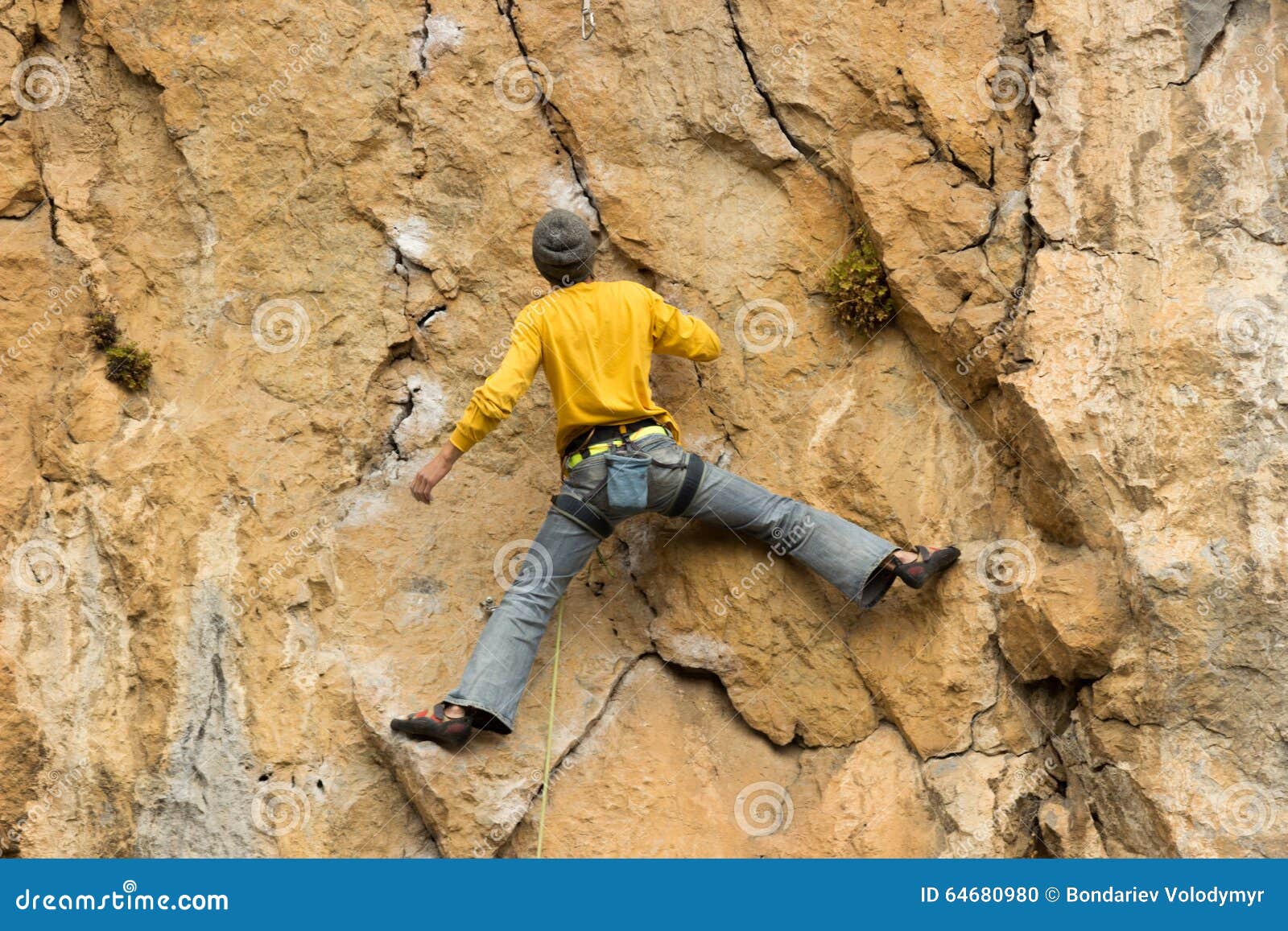 Young Male Climber Hanging by a Cliff. Stock Photo - Image of grip ...