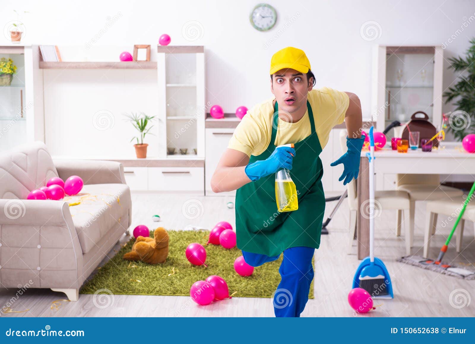Young Male Contractor Doing Housework after Party Stock Photo - Image ...