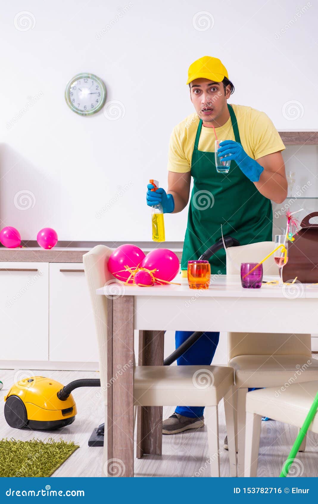 Young Male Contractor Doing Housework after Party Stock Photo - Image ...