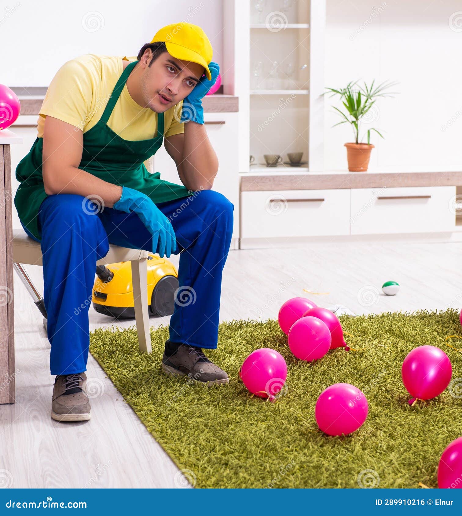 Young Male Contractor Doing Housework after Party Stock Photo - Image ...