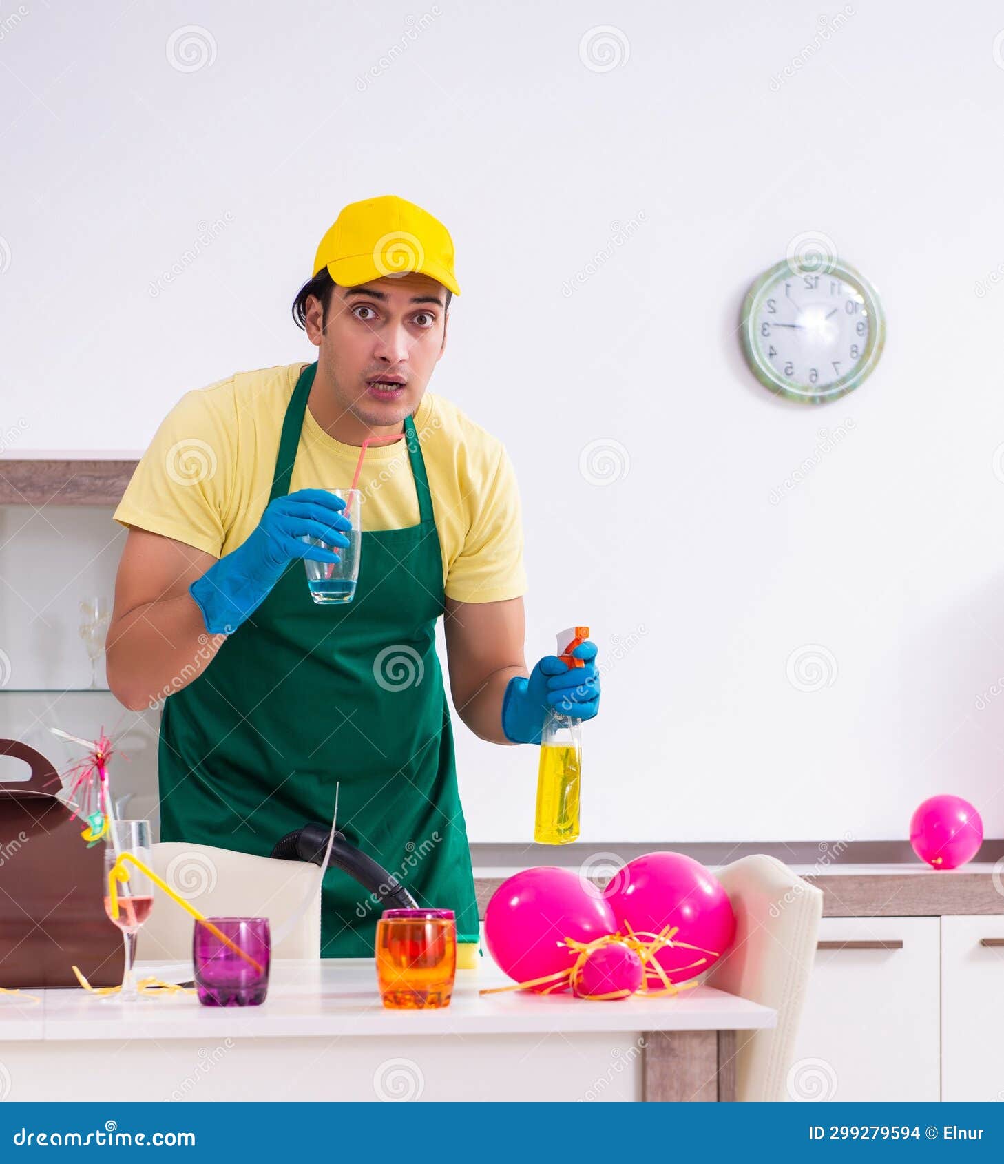 Young Male Contractor Doing Housework after Party Stock Photo - Image ...