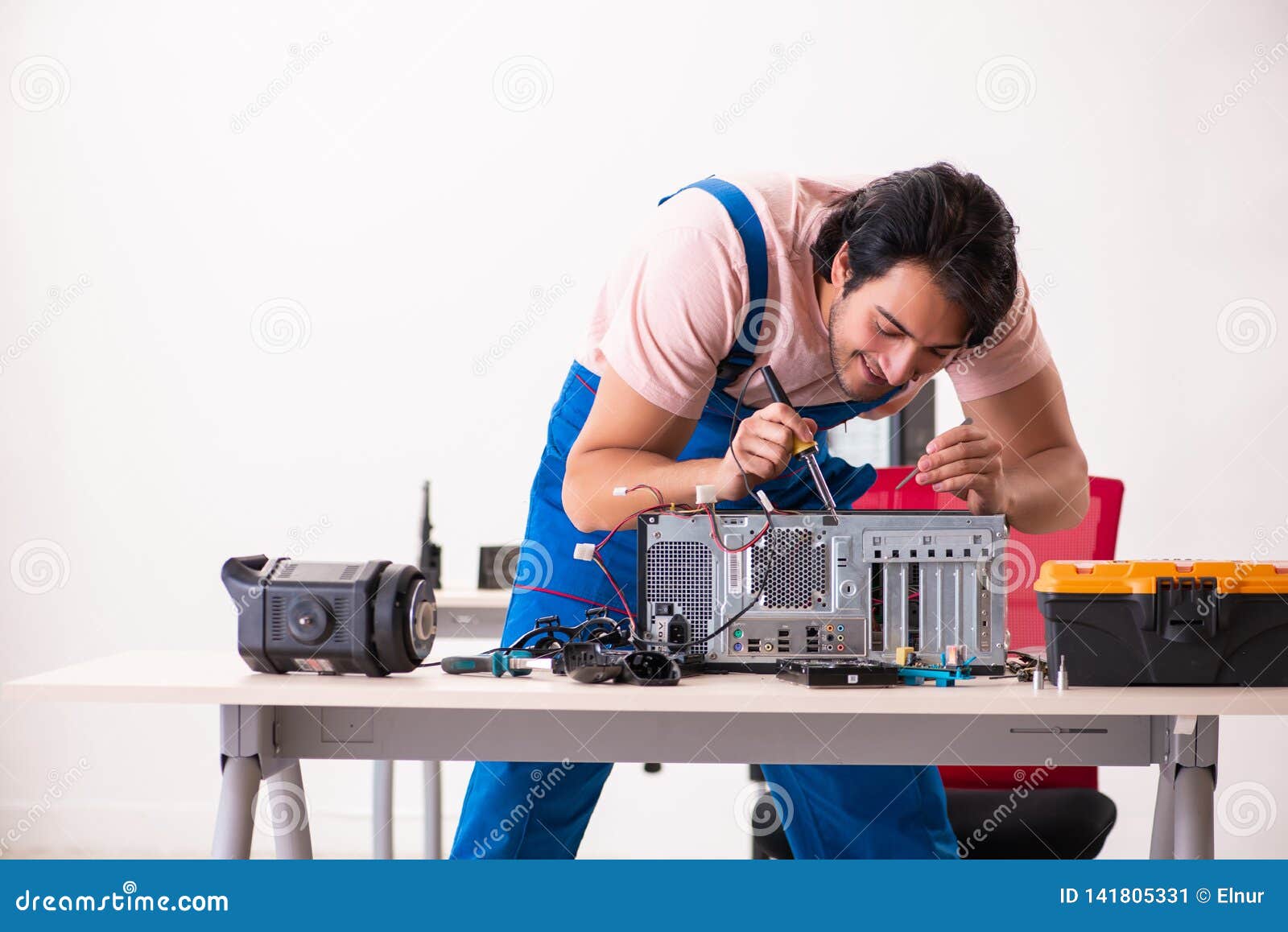 The Young Male Contractor Repairing Computer Stock Image - Image of ...