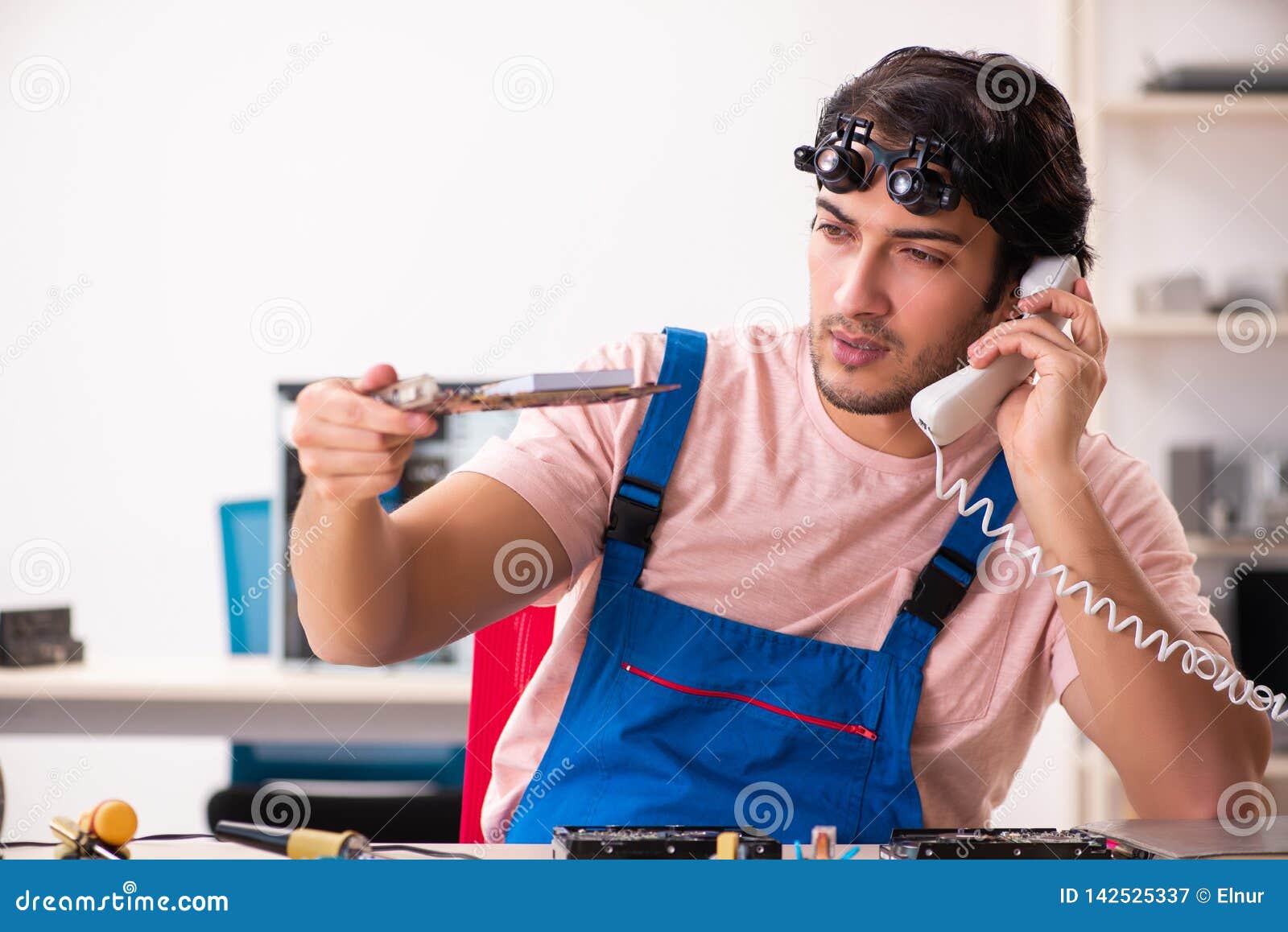 The Young Male Contractor Repairing Computer Stock Image - Image of ...