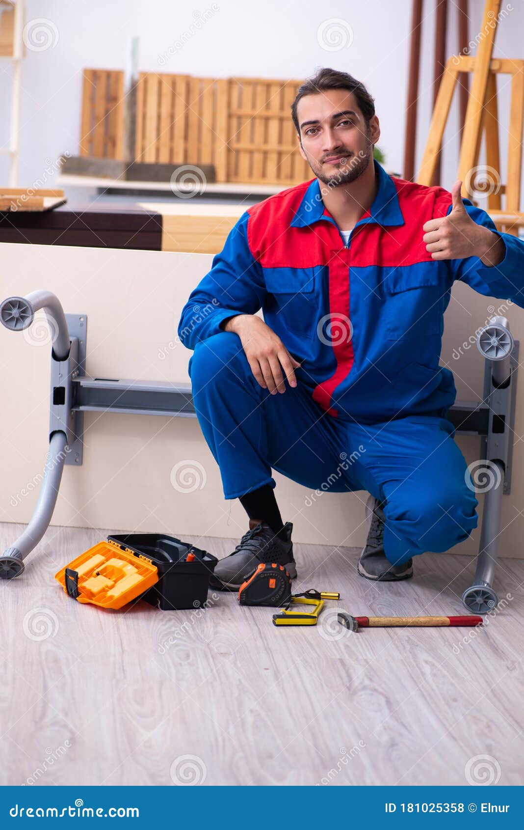 Young Male Contractor Working in Workshop Stock Photo - Image of ...