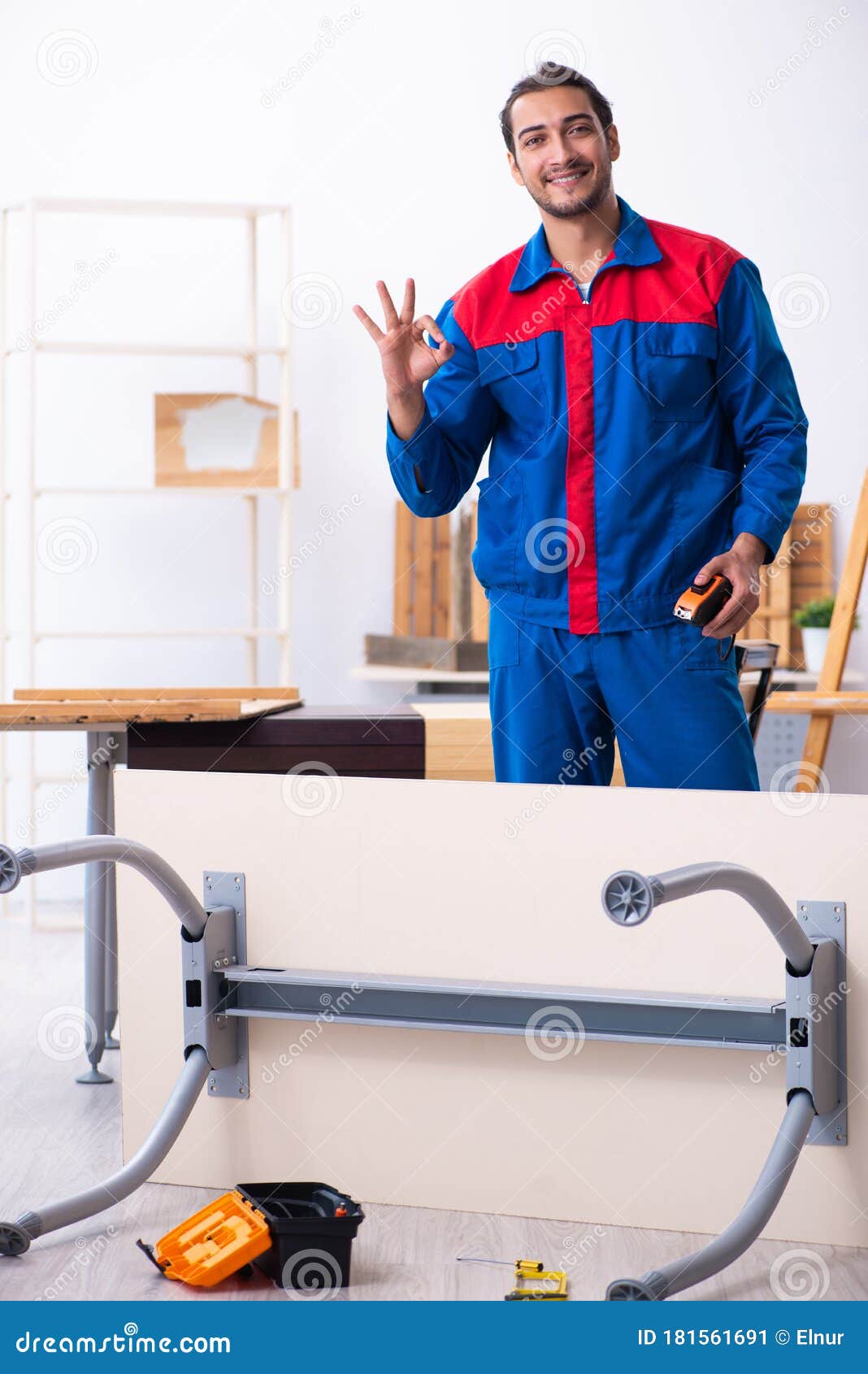 Young Male Contractor Working in Workshop Stock Image - Image of ...