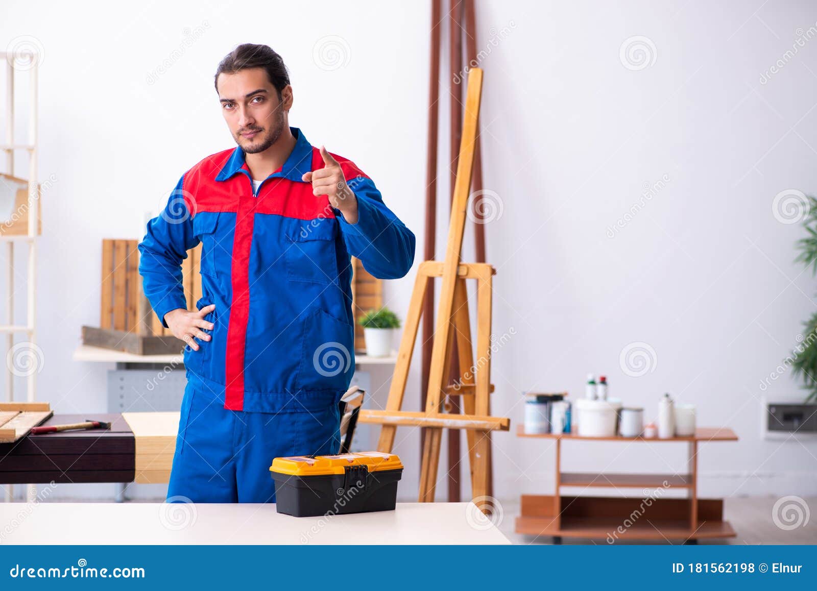 Young Male Contractor Working in Workshop Stock Photo - Image of ...