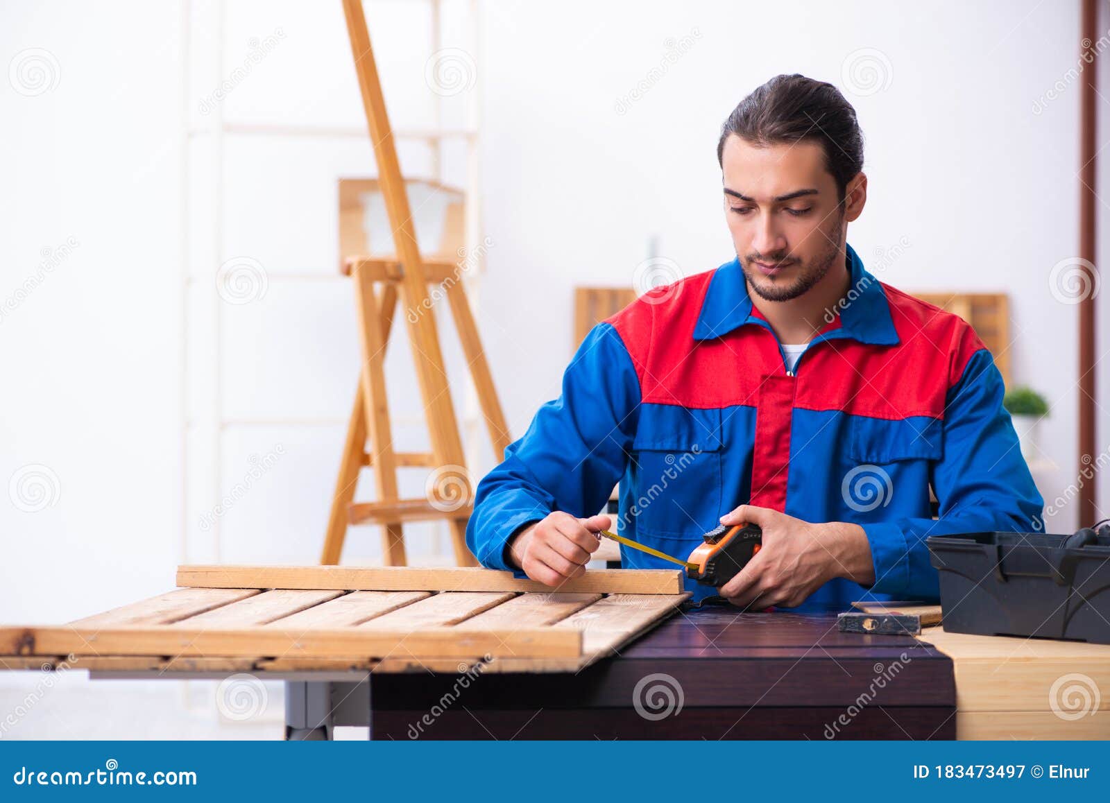 Young Male Contractor Working in Workshop Stock Image - Image of ...