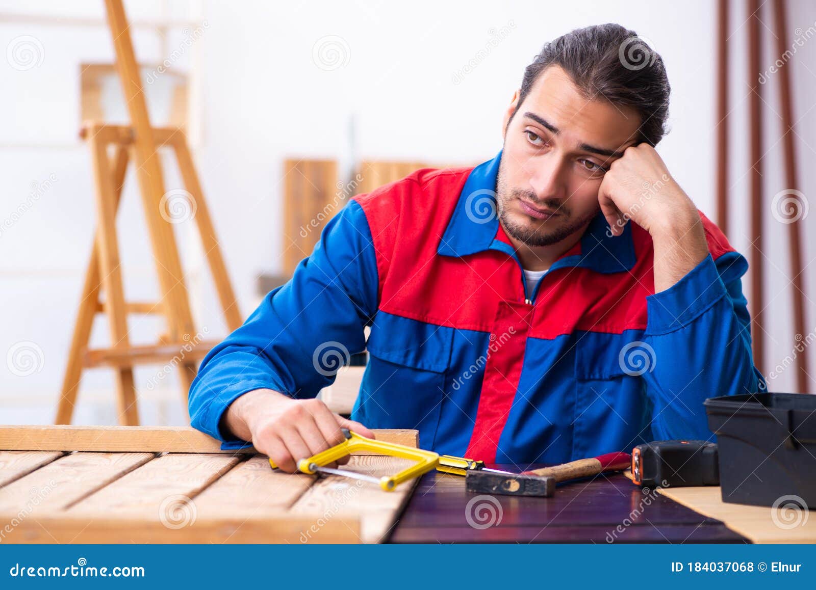 Young Male Contractor Working in Workshop Stock Photo - Image of ...