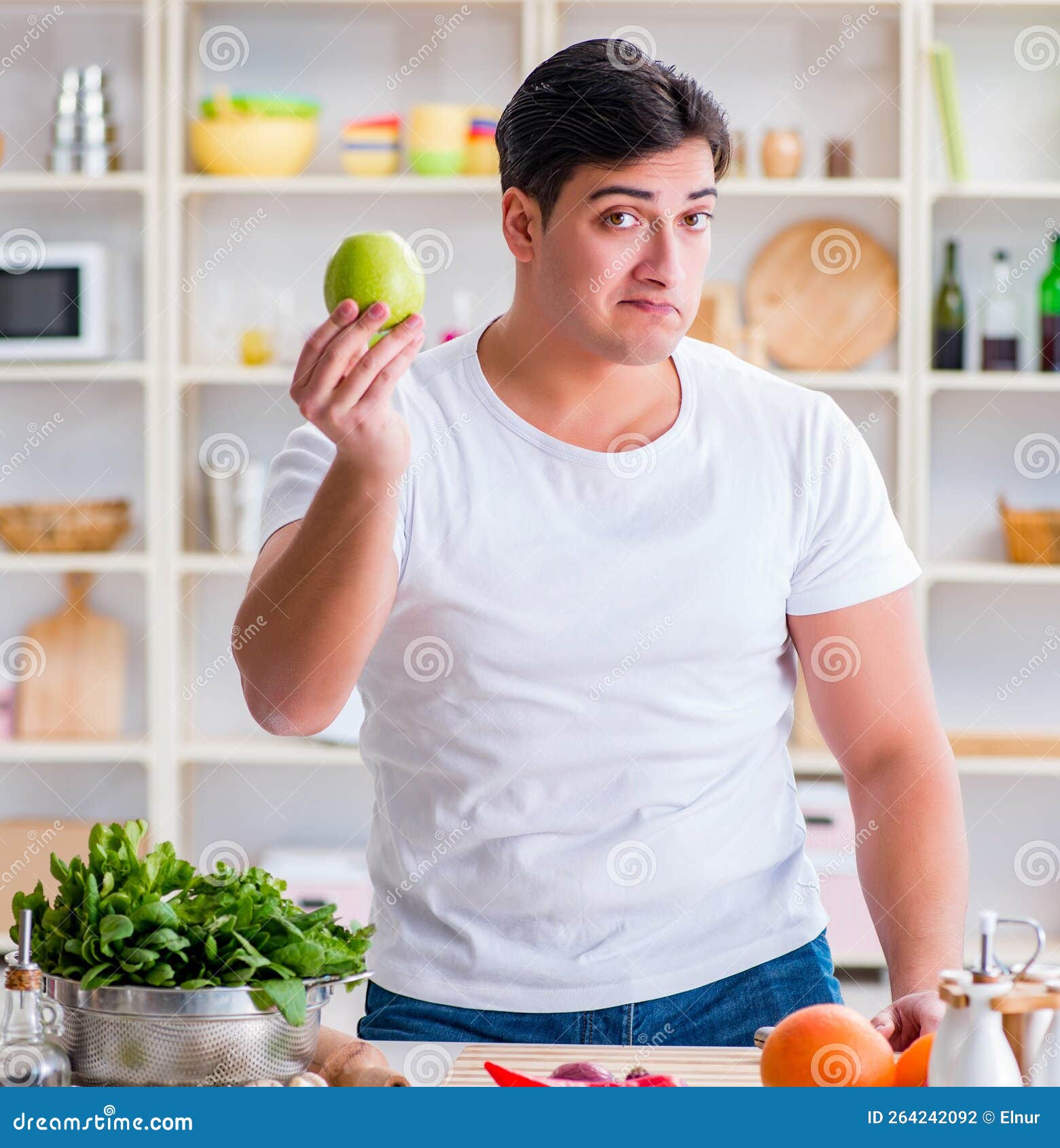 Young Male Cook Working in the Kitchen Stock Photo - Image of food ...