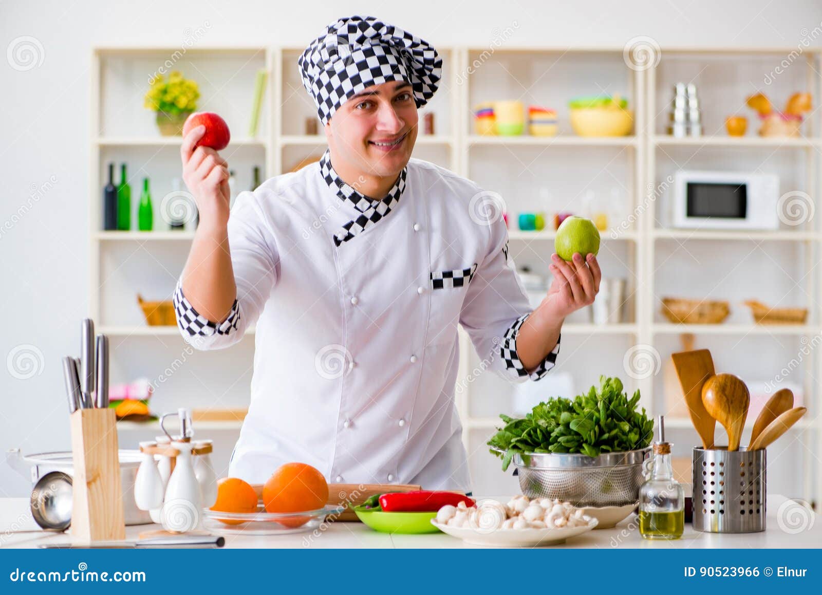 The Young Male Cook Working in the Kitchen Stock Photo - Image of cook ...