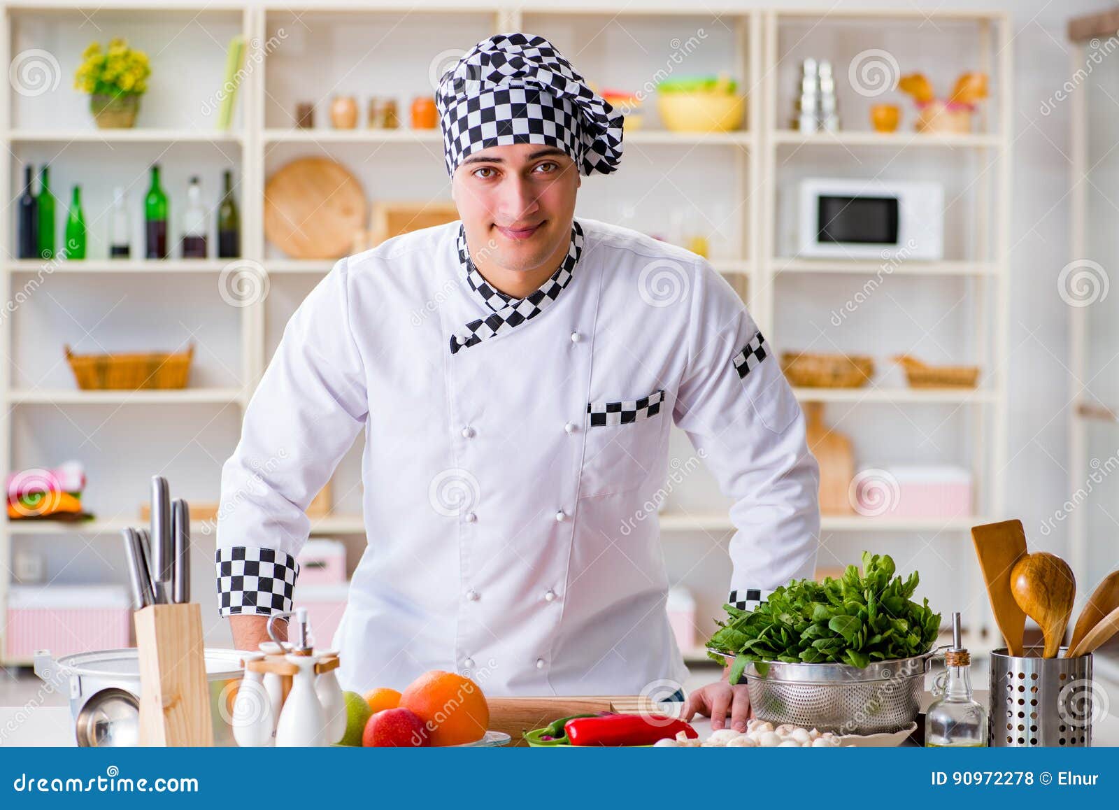 The Young Male Cook Working in the Kitchen Stock Photo - Image of green ...