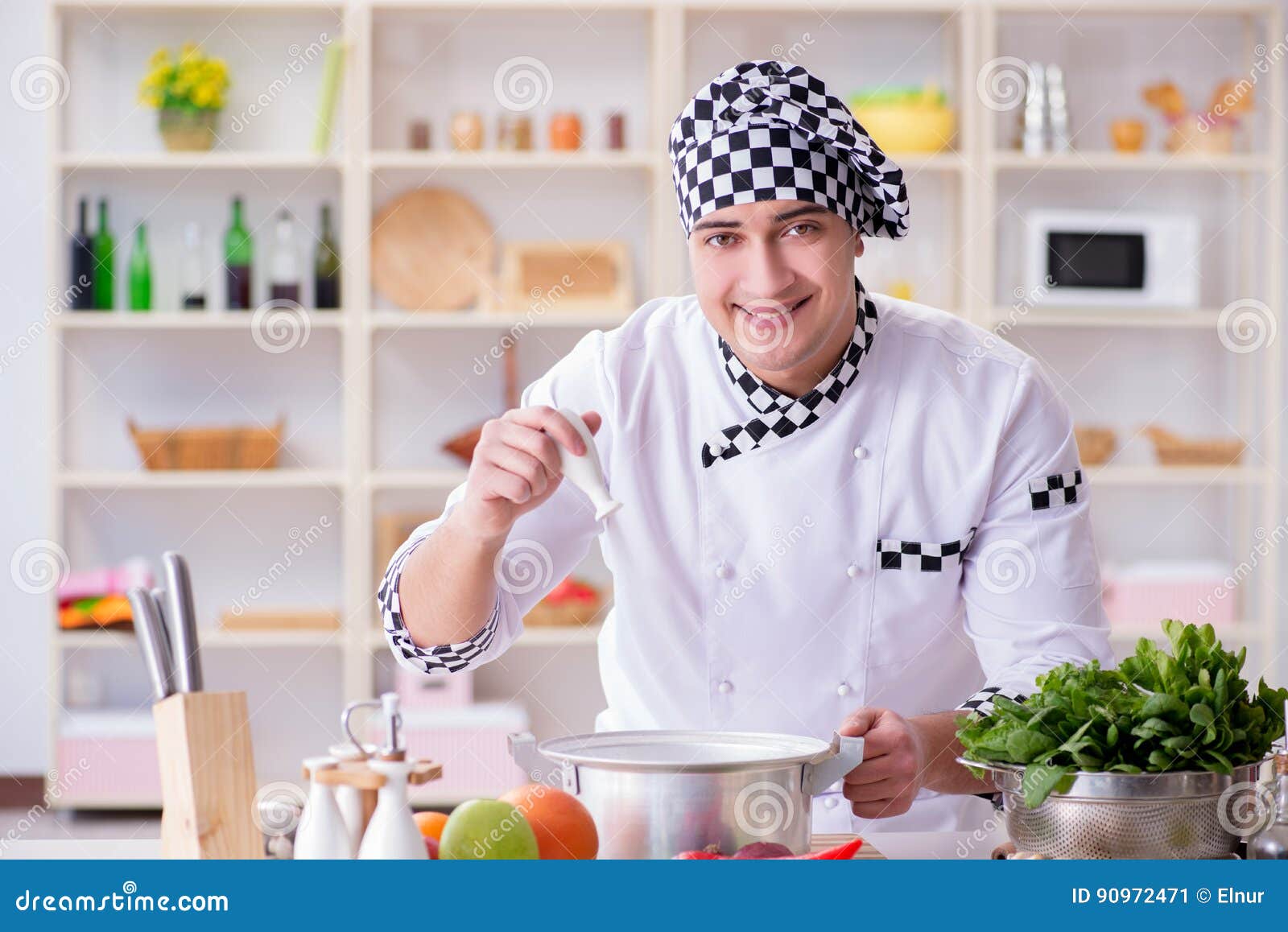 The Young Male Cook Working in the Kitchen Stock Image - Image of green ...