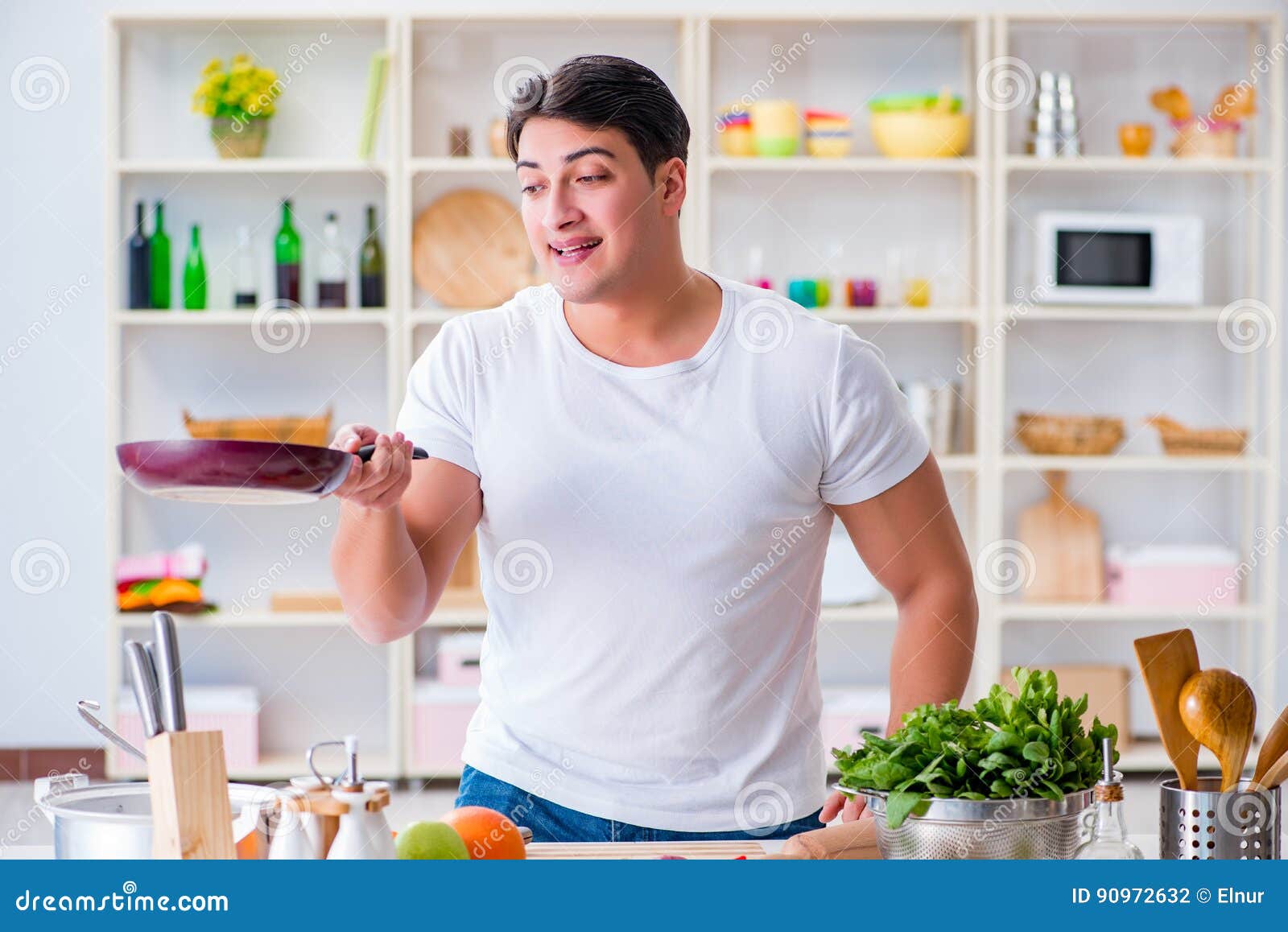 The Young Male Cook Working in the Kitchen Stock Photo - Image of fresh ...