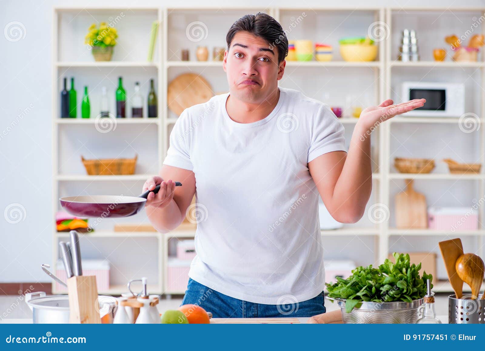 The Young Male Cook Working in the Kitchen Stock Image - Image of ...