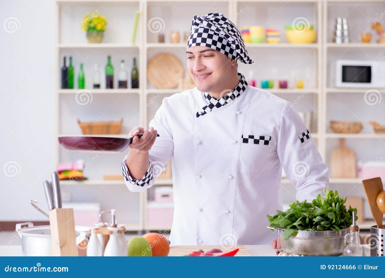 The Young Male Cook Working in the Kitchen Stock Photo - Image of ...