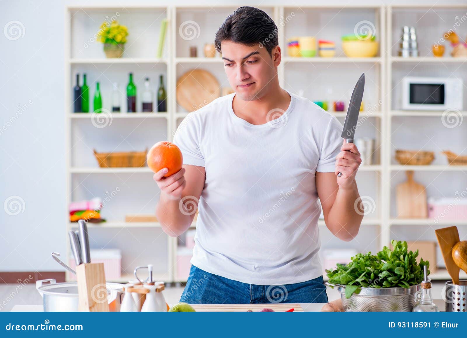 The Young Male Cook Working in the Kitchen Stock Image - Image of cook ...