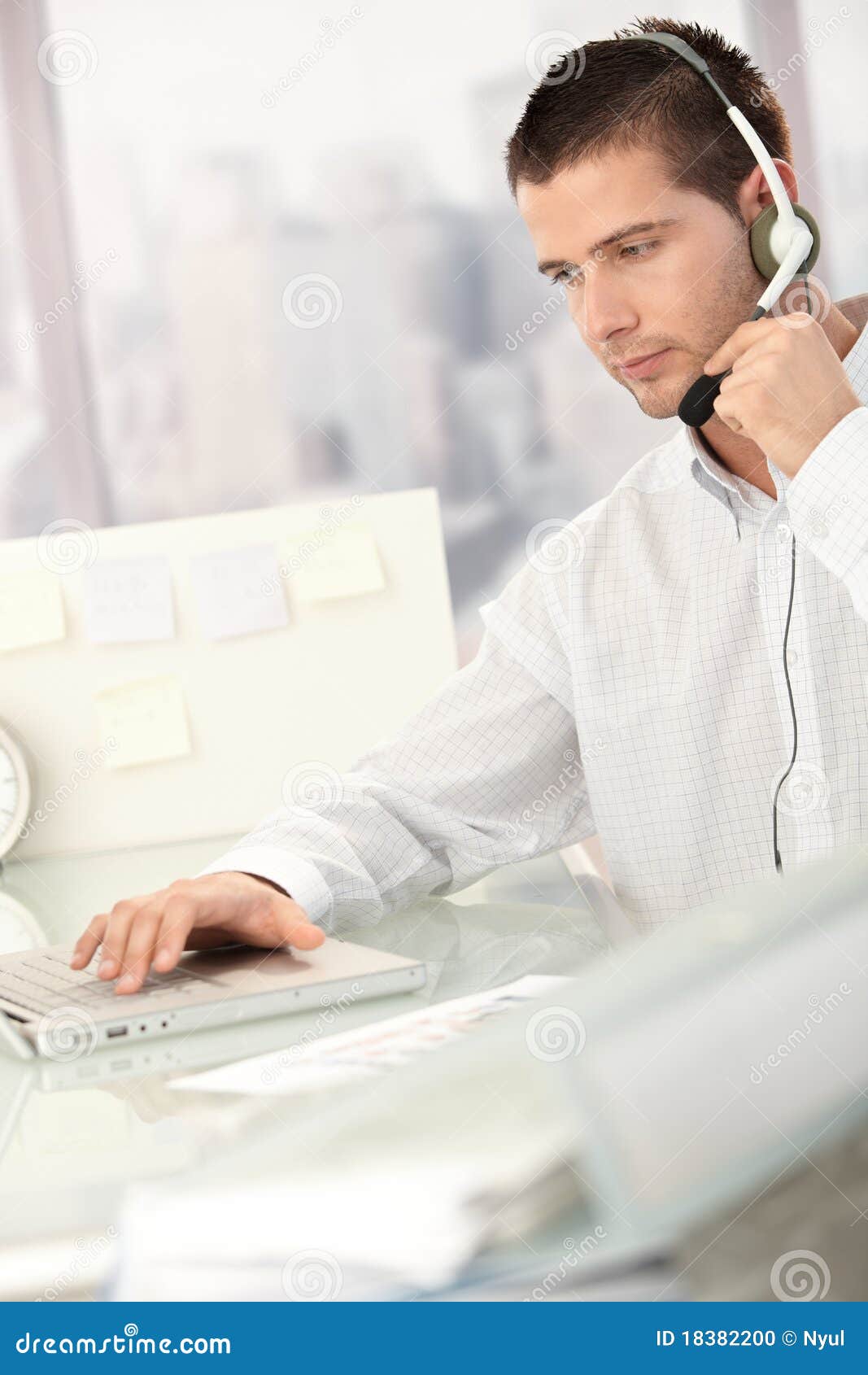 Young Male Dispatcher Working in Office Stock Photo - Image of ...