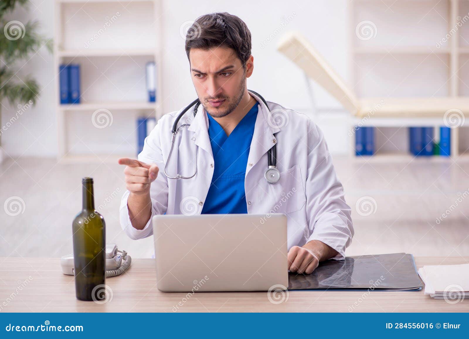 Young Male Doctor in Alcoholism Concept Stock Photo - Image of alcohol ...