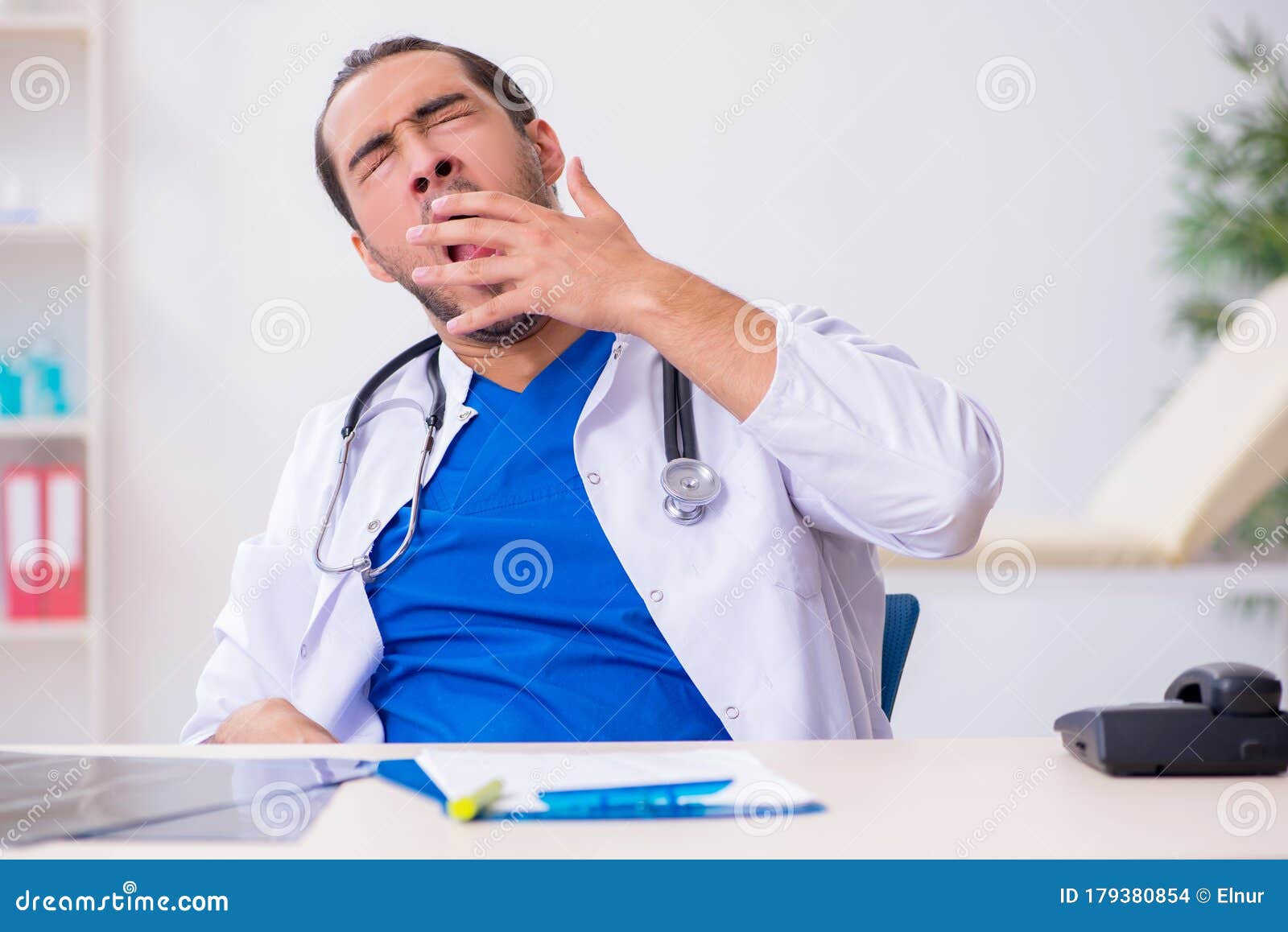 Young Male Doctor Being Tired after Night Shift Stock Photo - Image of ...