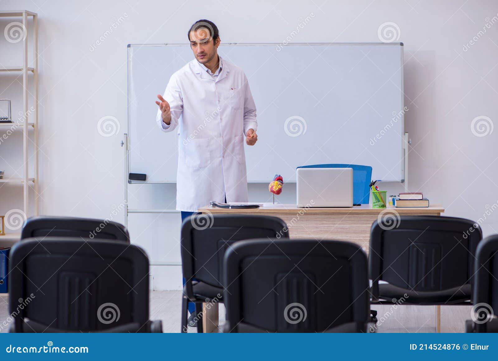 Young Male Doctor Giving Seminar in the Classroom Stock Photo - Image ...