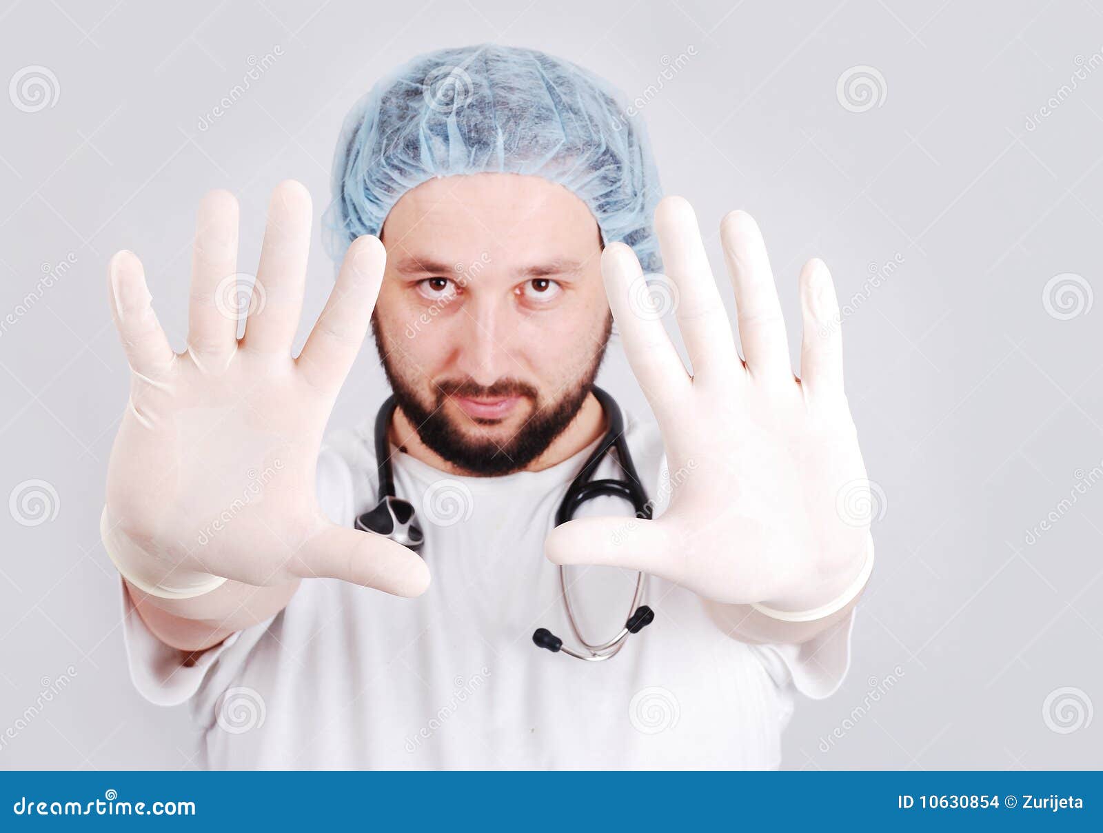 Young Male Doctor with Hands in Front and Surgery Stock Photo - Image ...