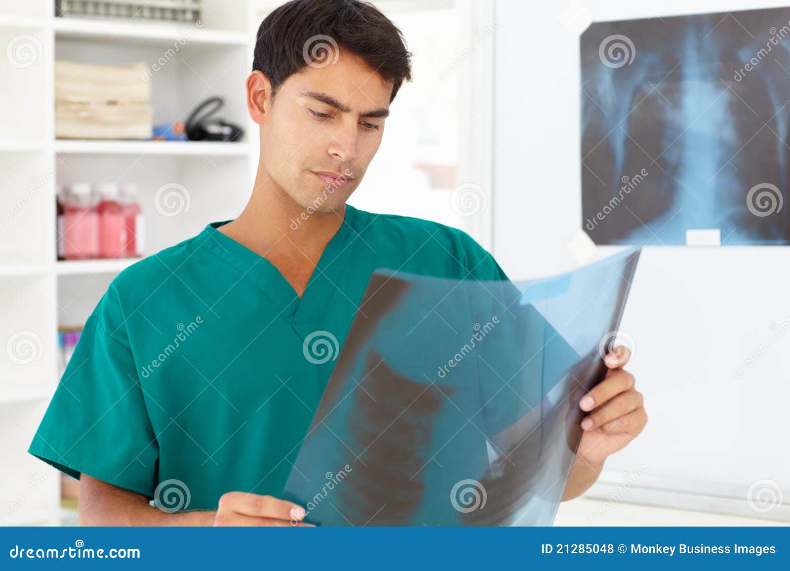 Young Male Doctor with X-ray Stock Photo - Image of surgery, serious ...