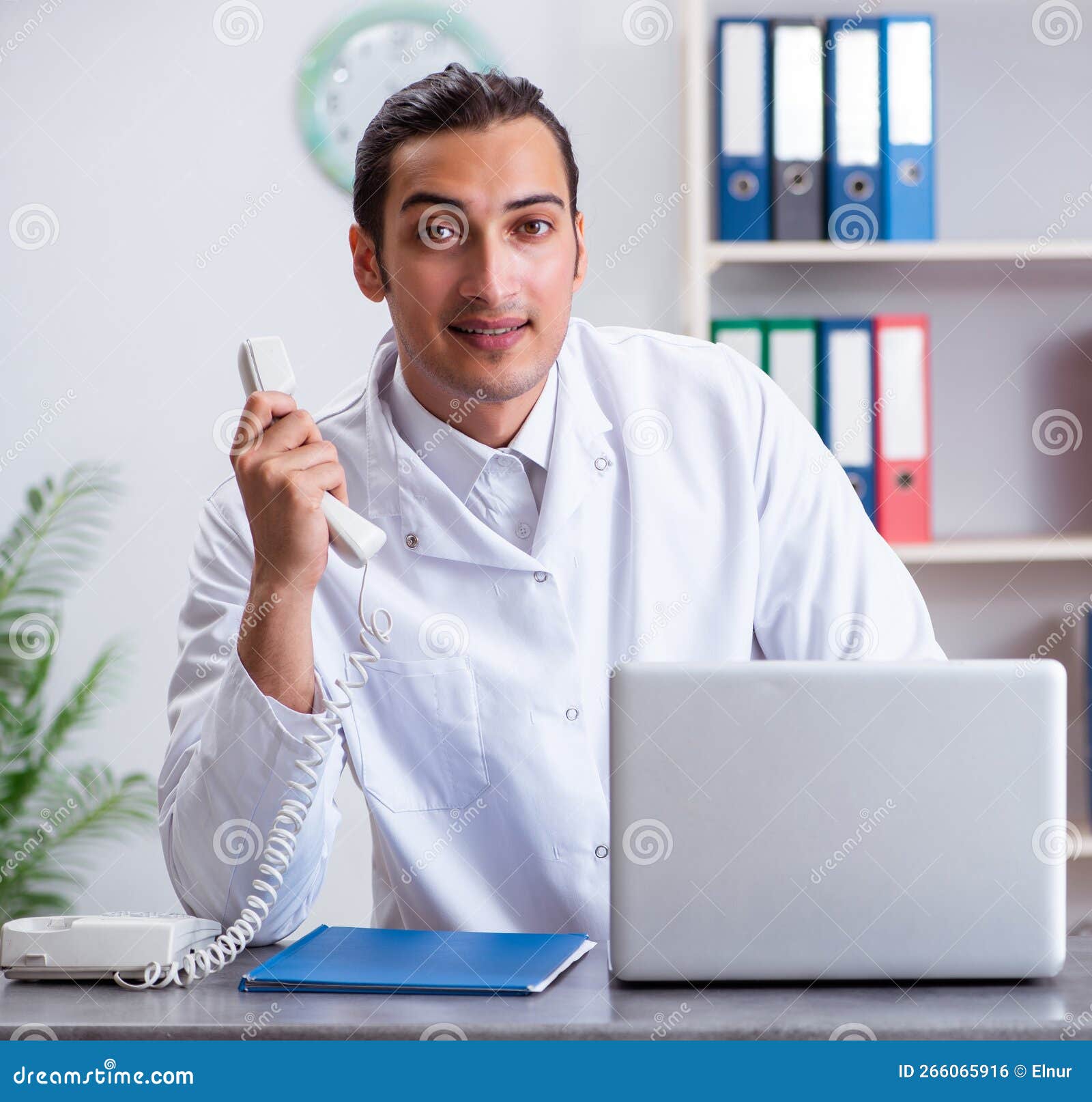 Young Male Doctor at the Reception in the Hospital Stock Photo - Image ...