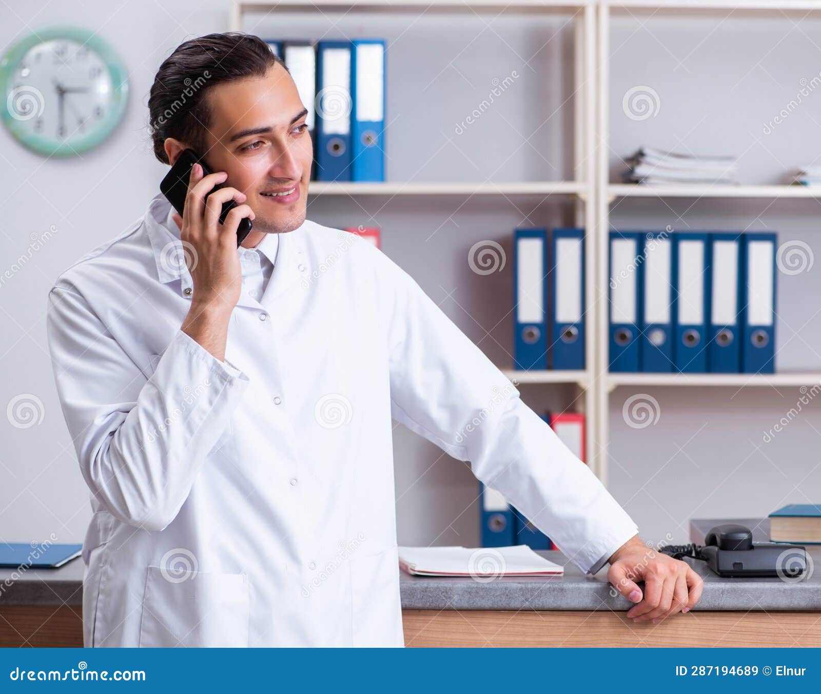Young Male Doctor at the Reception in the Hospital Stock Image - Image ...