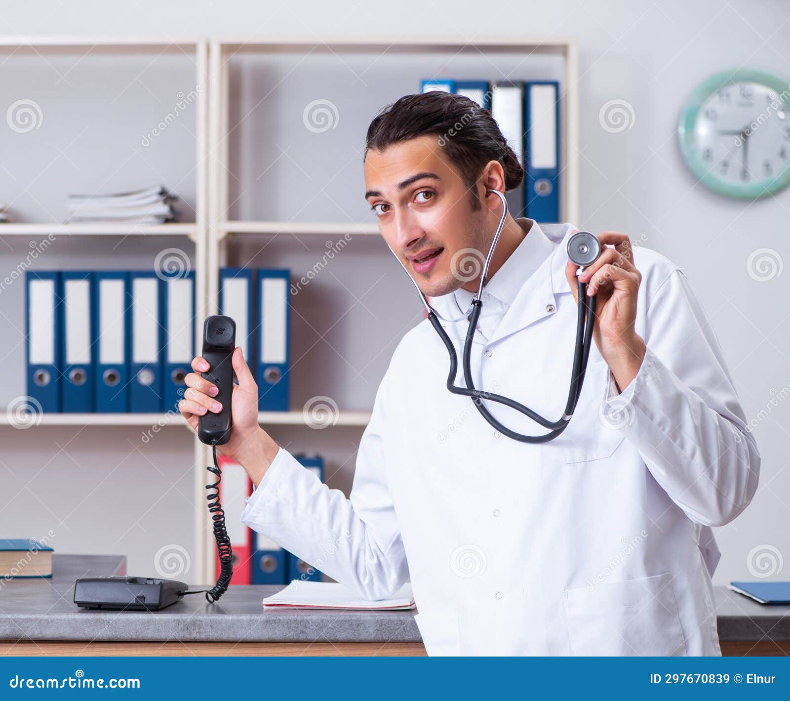 Young Male Doctor at the Reception in the Hospital Stock Image - Image ...