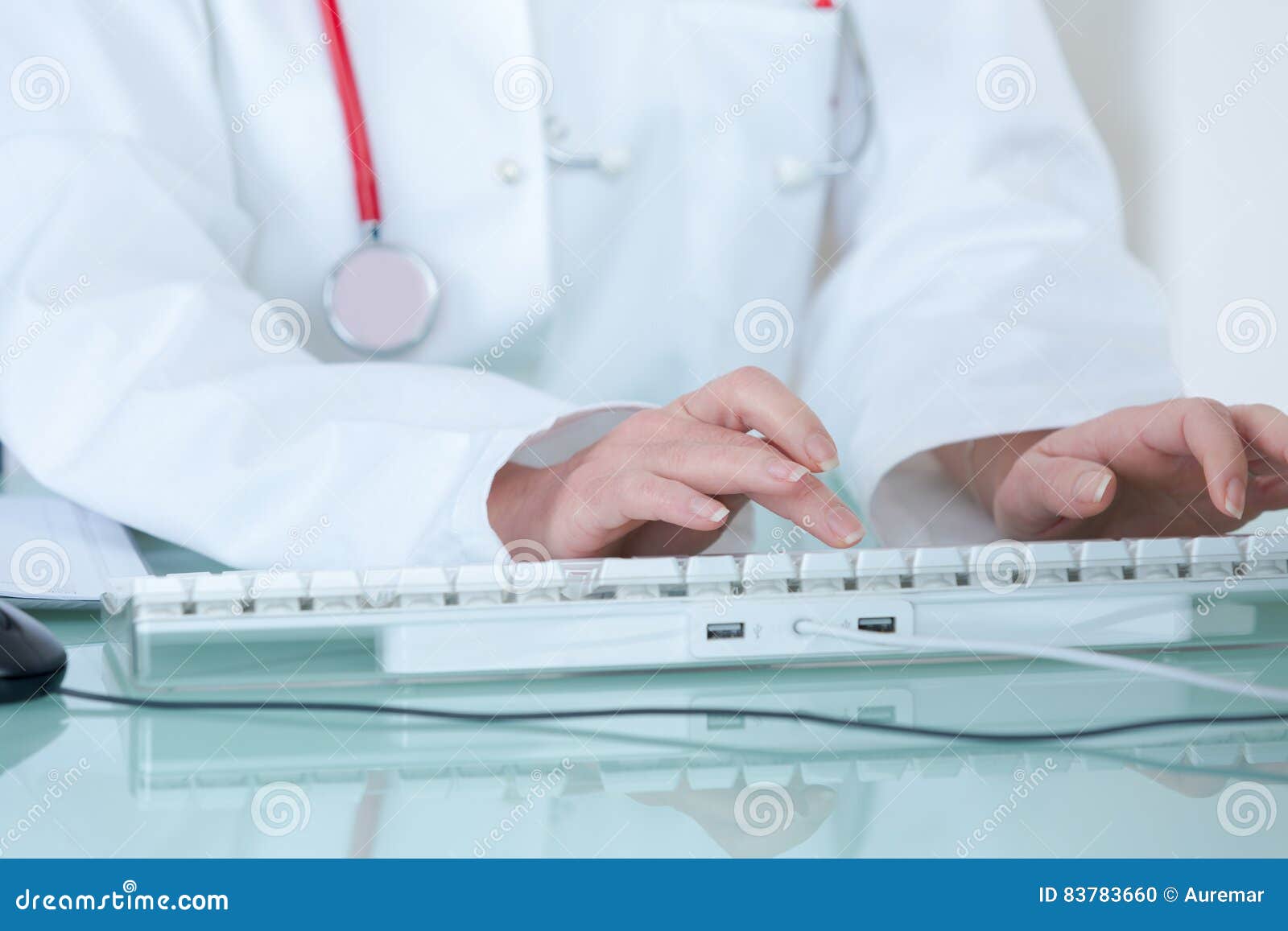 Young Male Doctor Using Keyboard in Office Stock Photo - Image of ...