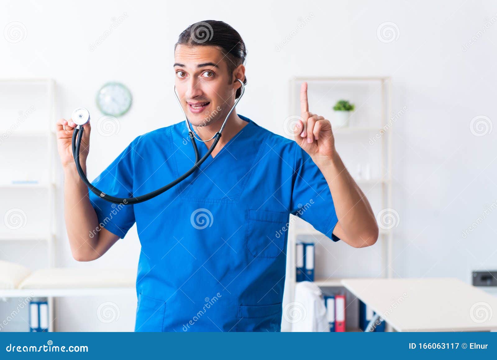 Young Male Doctor Working in the Clinic Stock Image - Image of ...