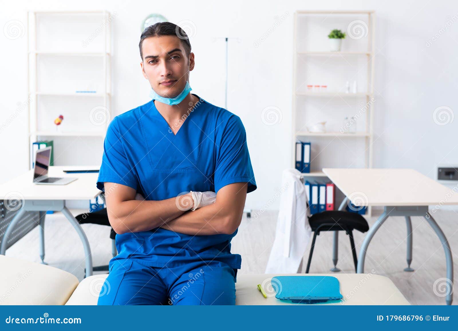 Young Male Doctor Working in the Clinic Stock Photo - Image of ...