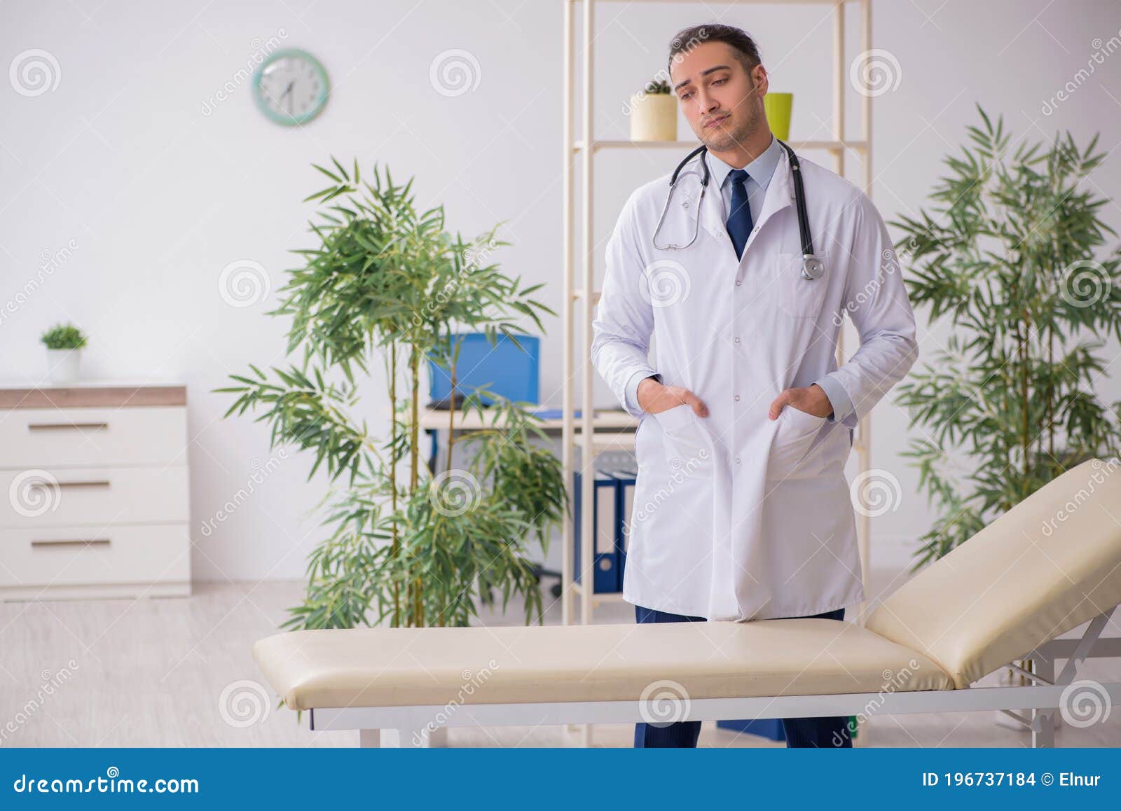 Young Male Doctor Working in the Clinic Stock Photo - Image of ...