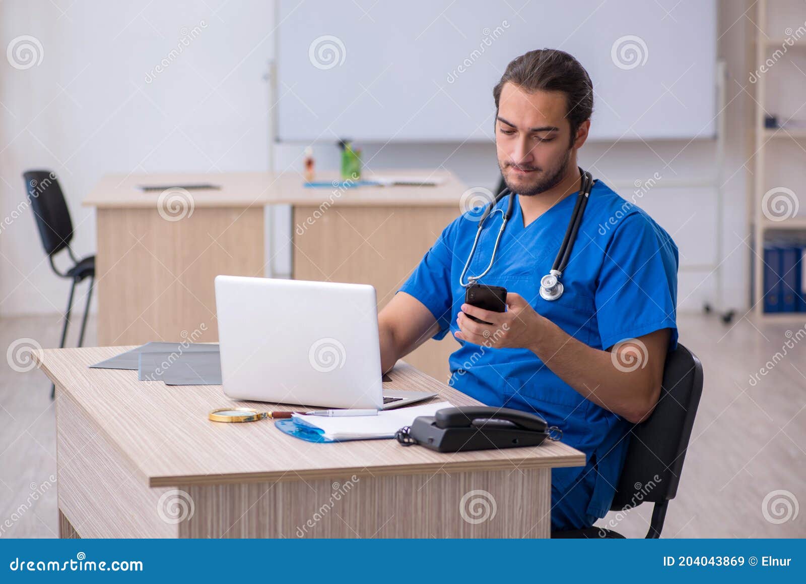 Young Male Doctor Working in the Clinic Stock Image - Image of care ...