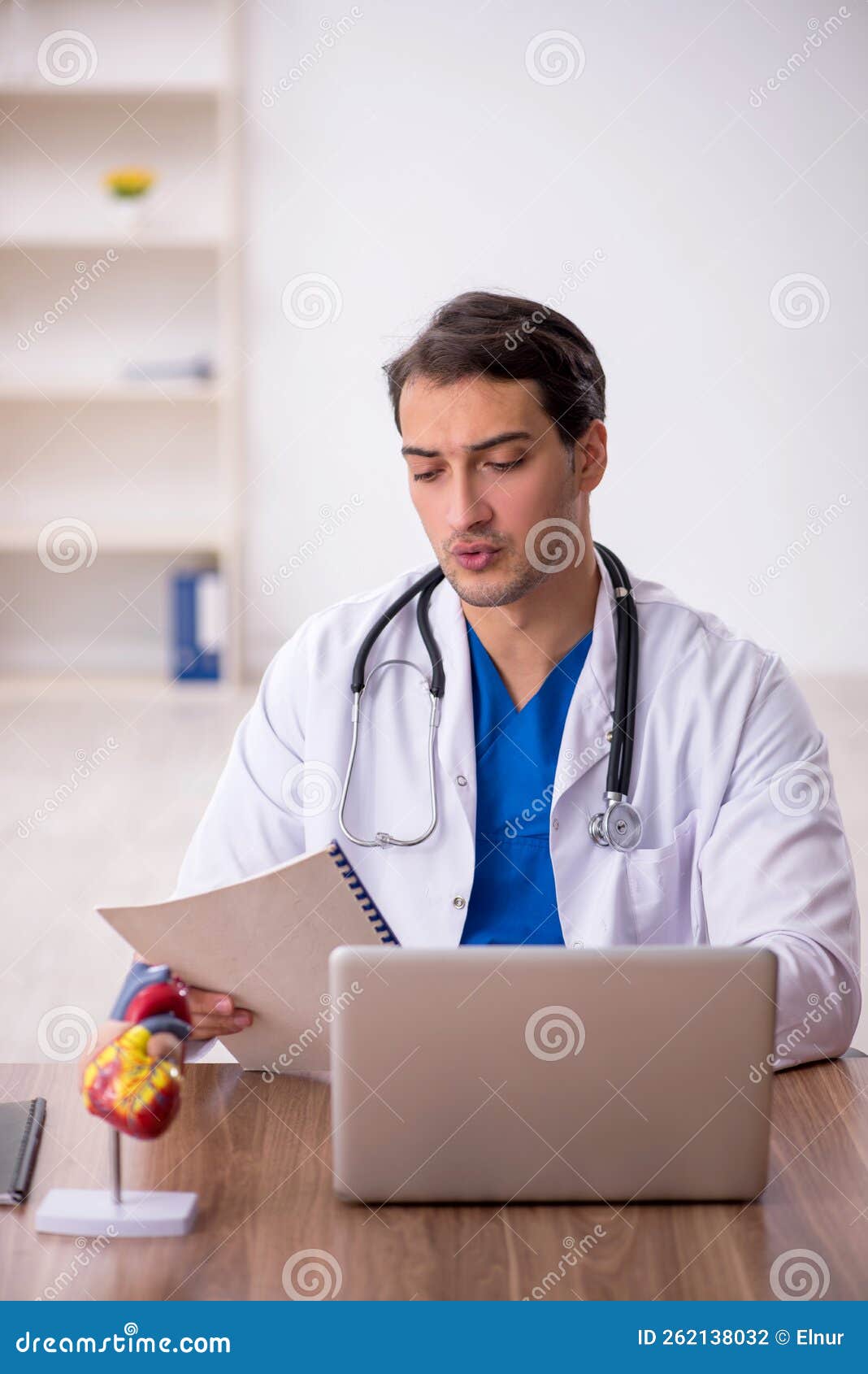Young Male Doctor Working in the Clinic Stock Photo - Image of ...