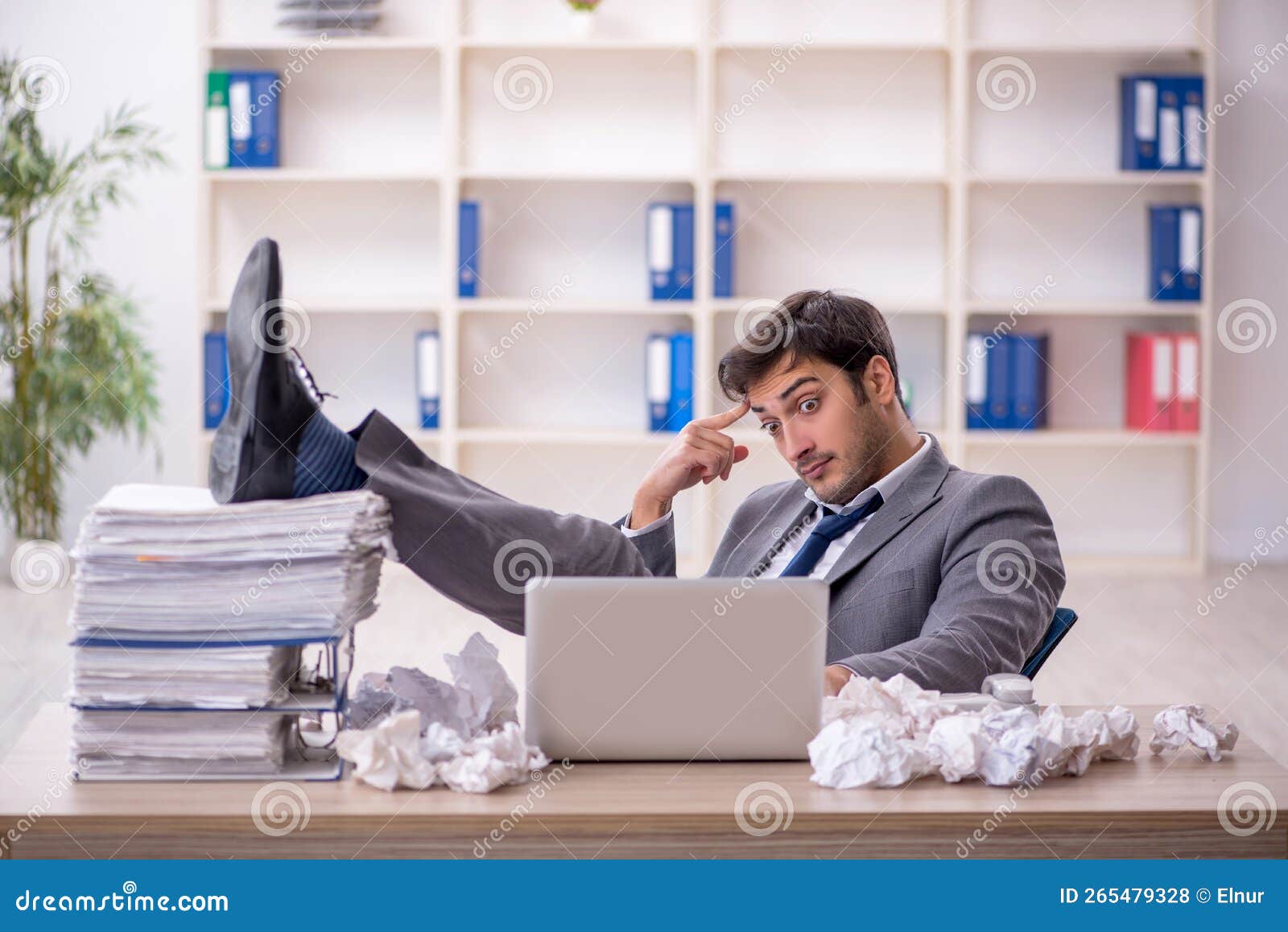 Young Male Employee in Brainstorming Concept Stock Photo - Image of ...
