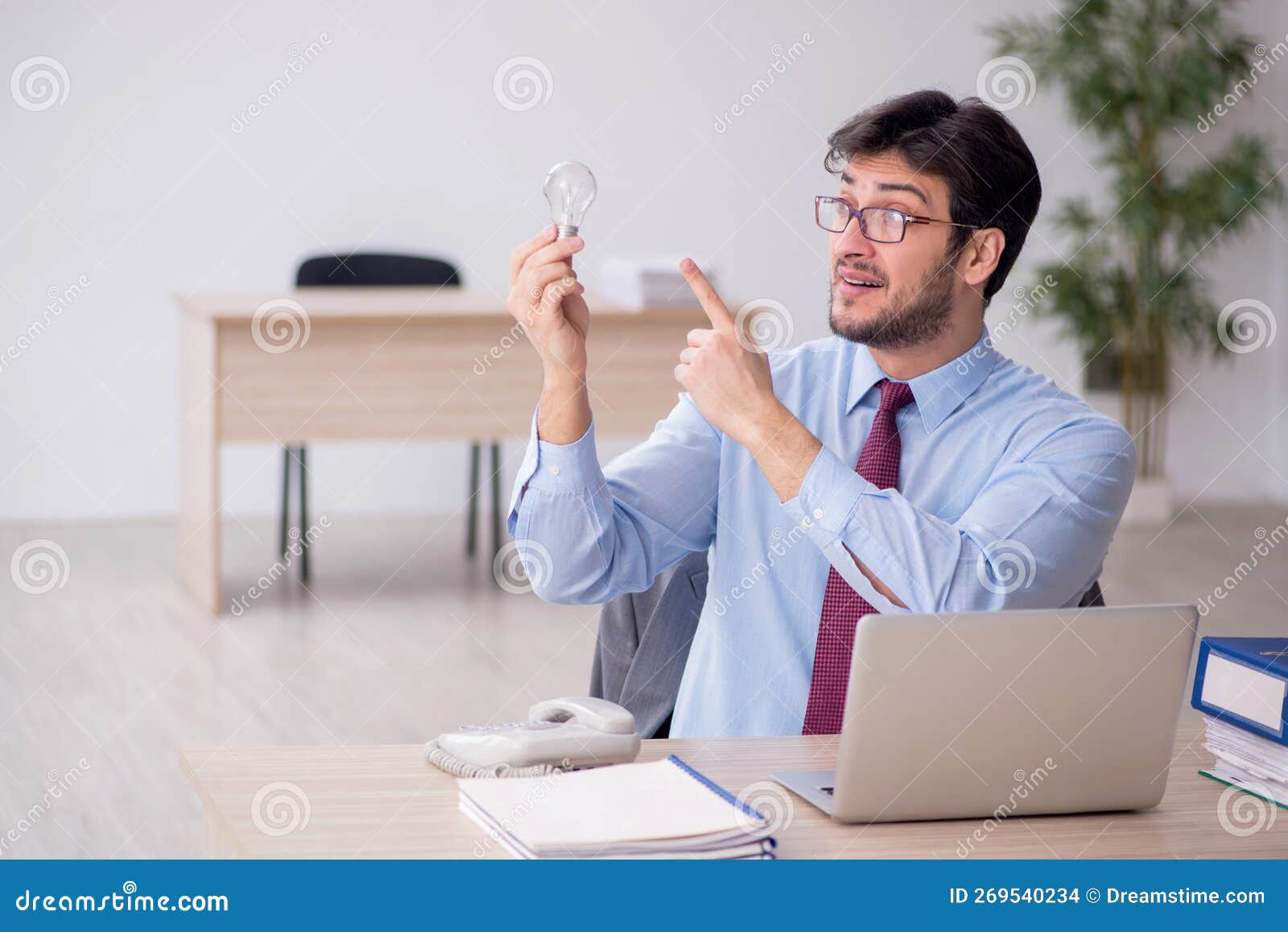 Young Male Employee in Brainstorming Concept Stock Photo - Image of ...