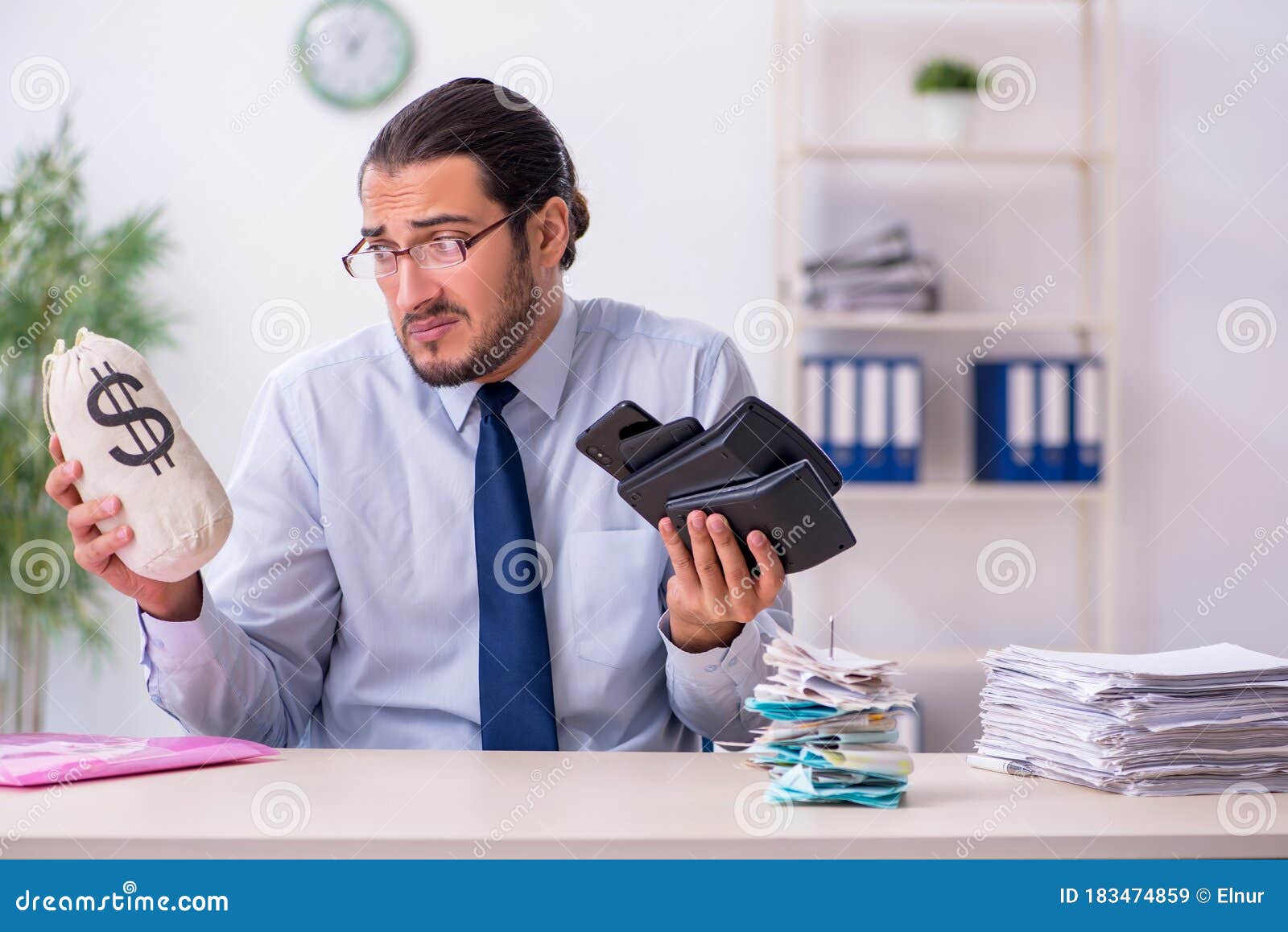 Young Male Employee in Budget Planning Concept Stock Image - Image of ...