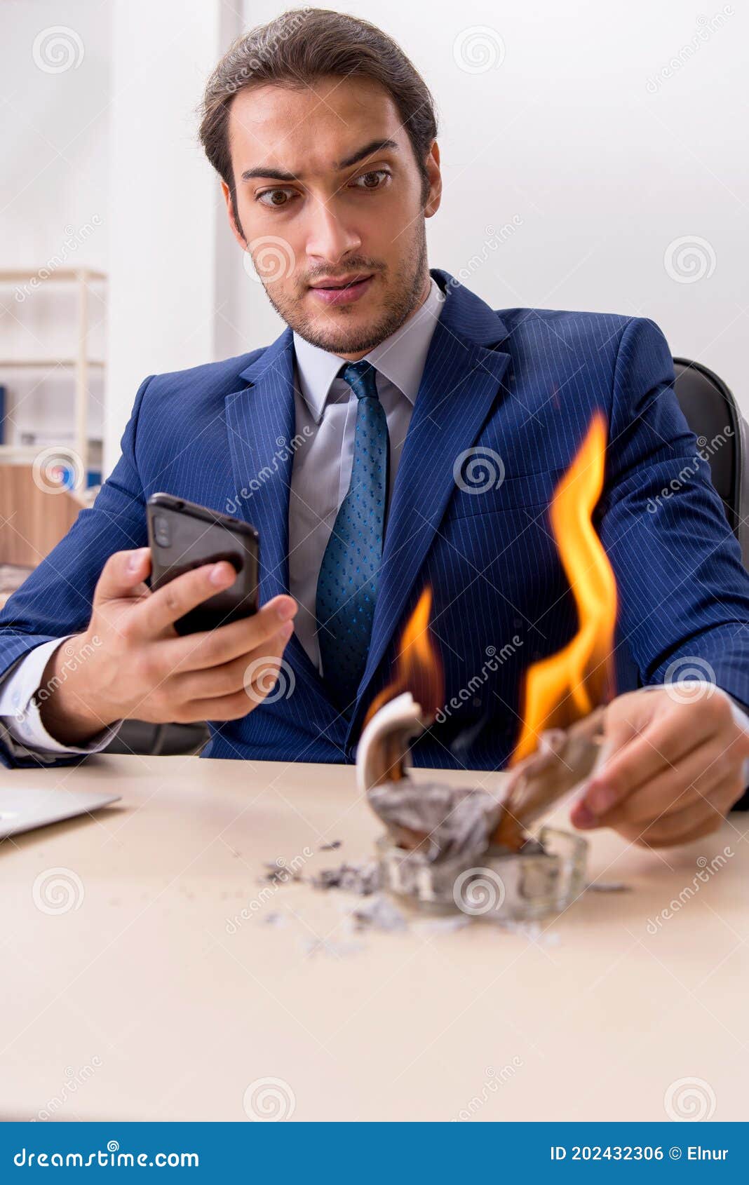 Young Male Employee Burning Papers in the Office Stock Photo - Image of ...