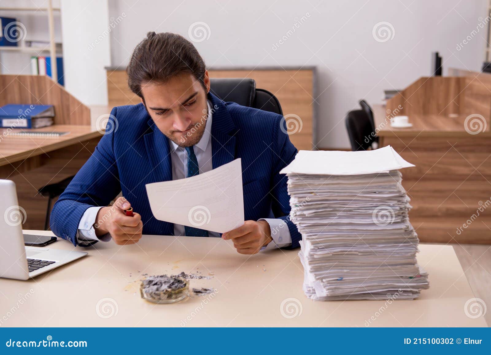 Young Male Employee Burning Papers in the Office Stock Photo - Image of ...