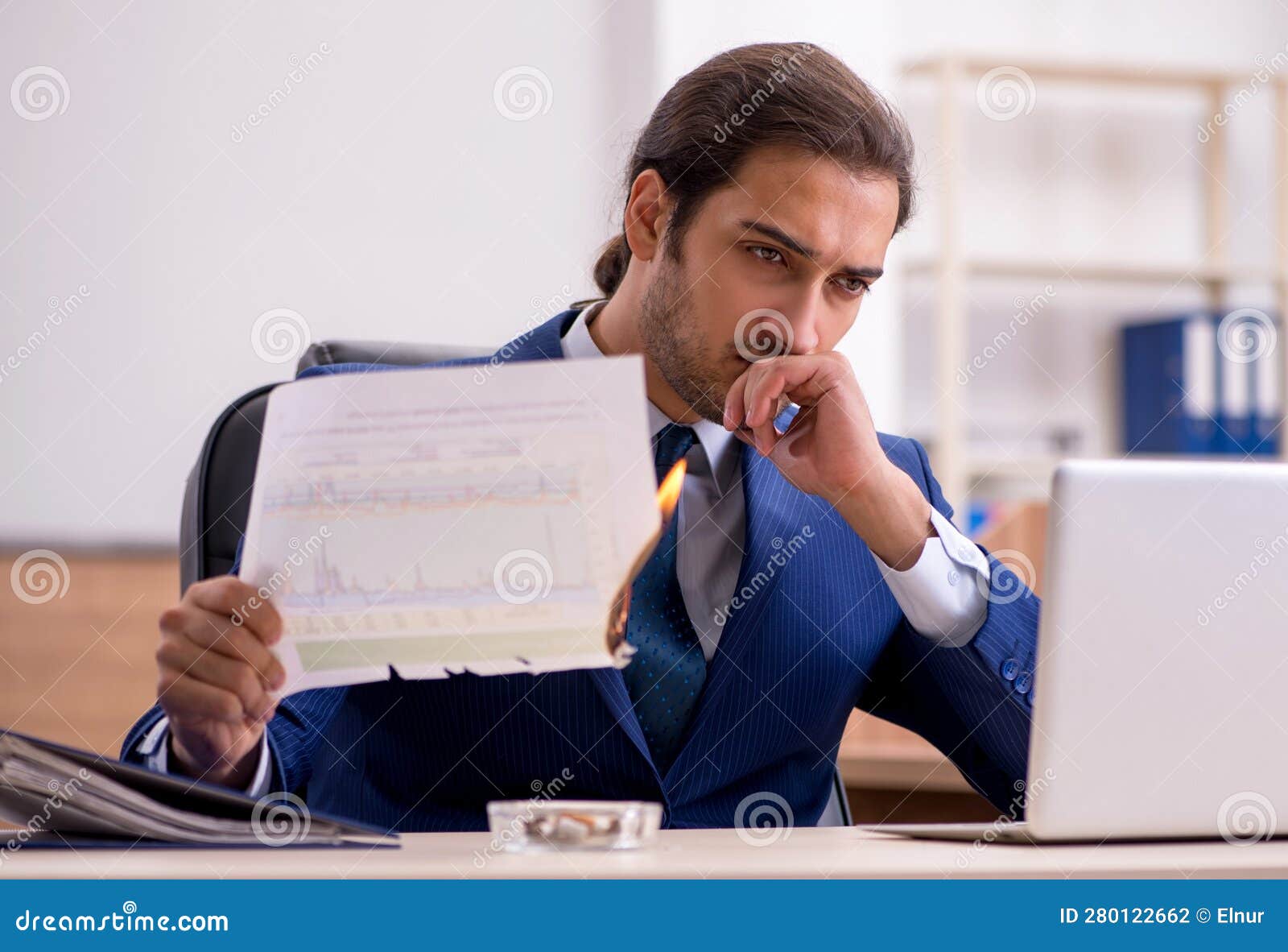 Young Male Employee Burning Papers in the Office Stock Photo - Image of ...