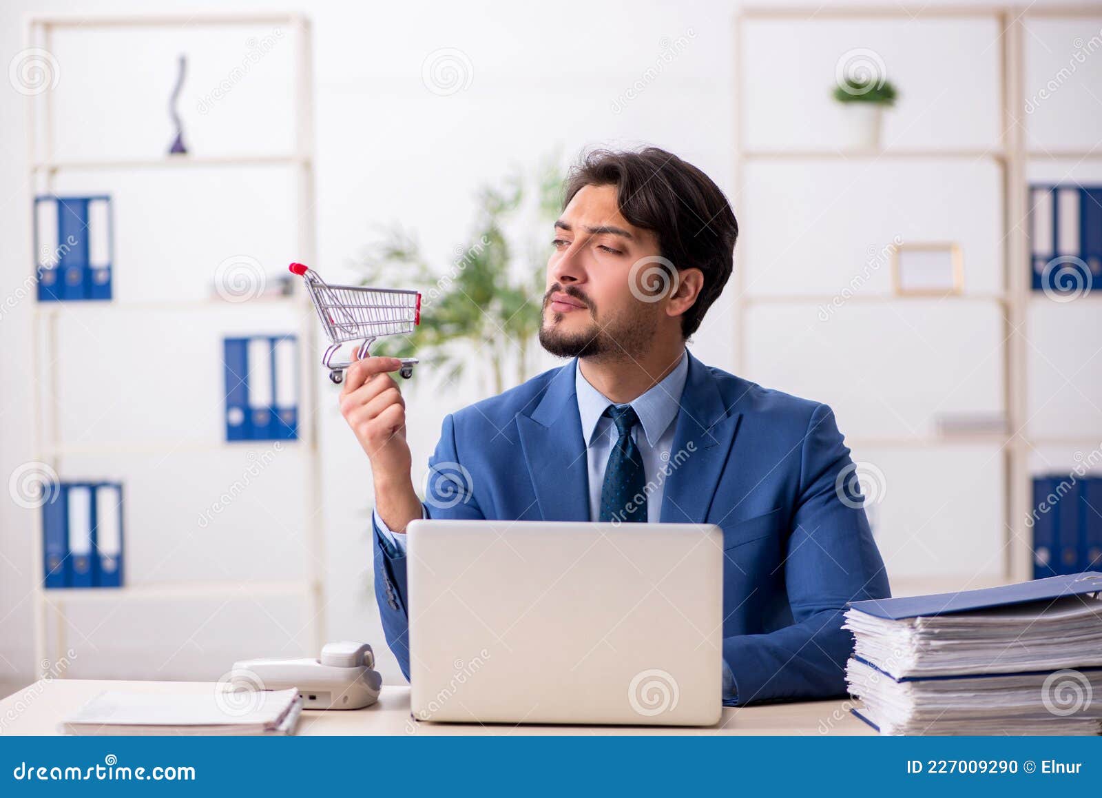 Young Male Employee in E-commerce Concept Stock Photo - Image of mall ...