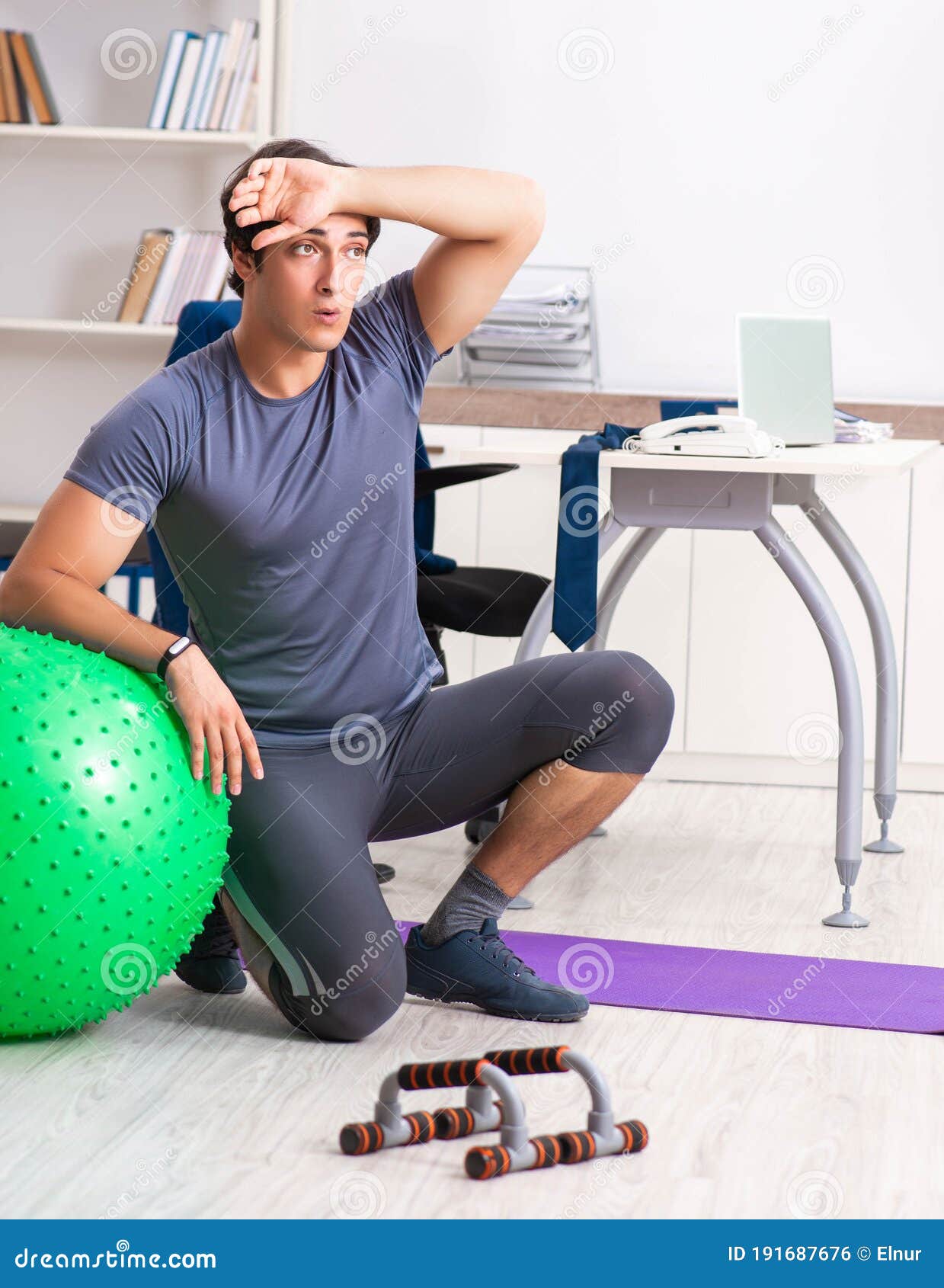 Young Male Employee Exercising in the Office Stock Photo - Image of ...