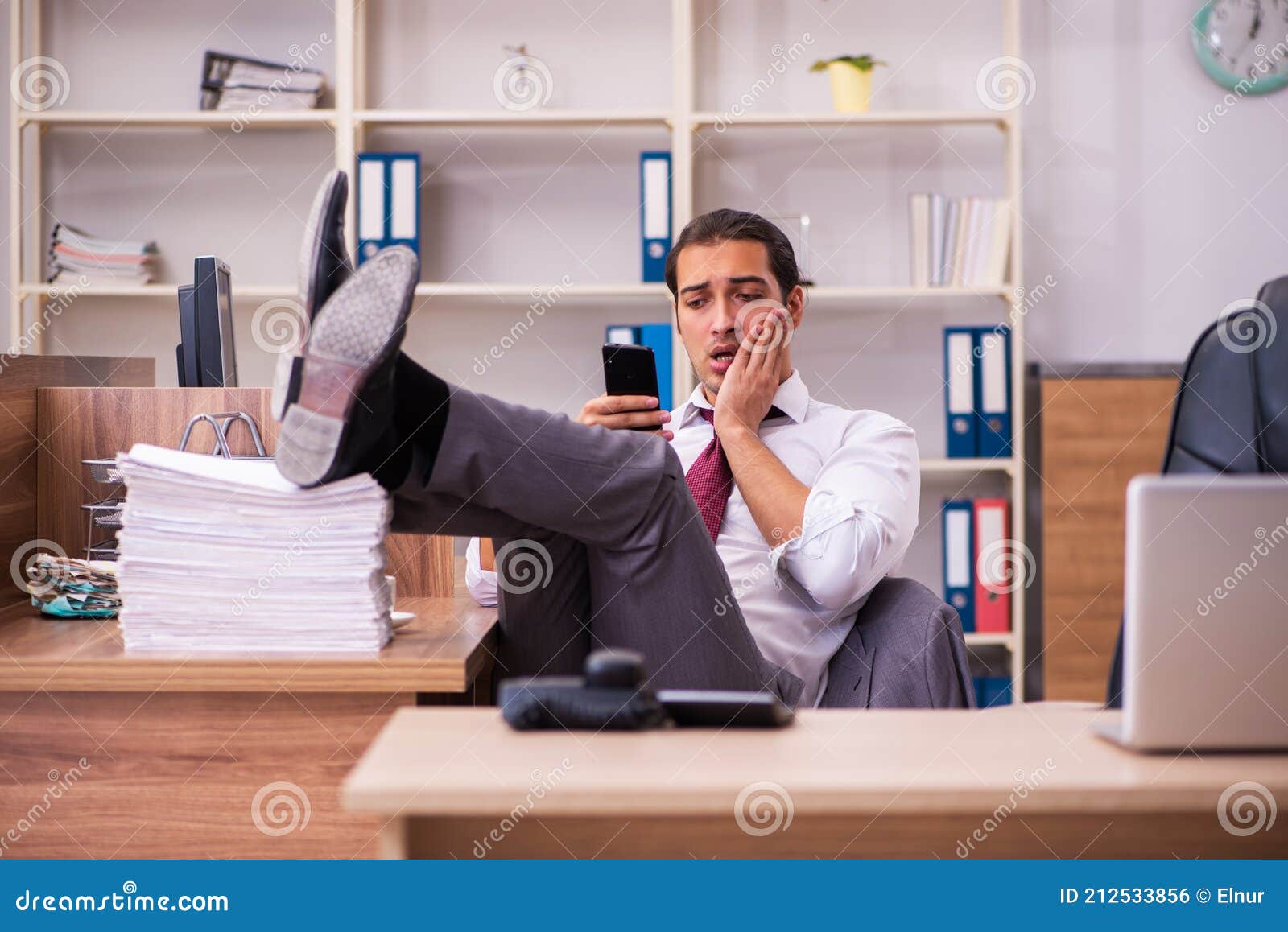 Young Male Employee Extremely Tired with Excessive Work Stock Photo ...